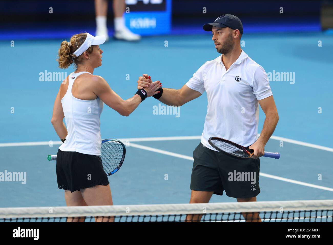 Laura Siegemund, left, and Tim Puetz of Germany celebrate defeating ...