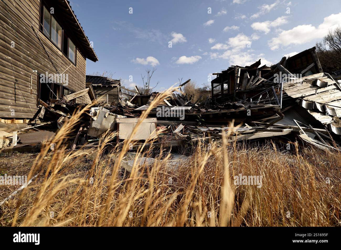 Photo taken on Jan. 1, 2025, shows a collapsed house in Wajima ...