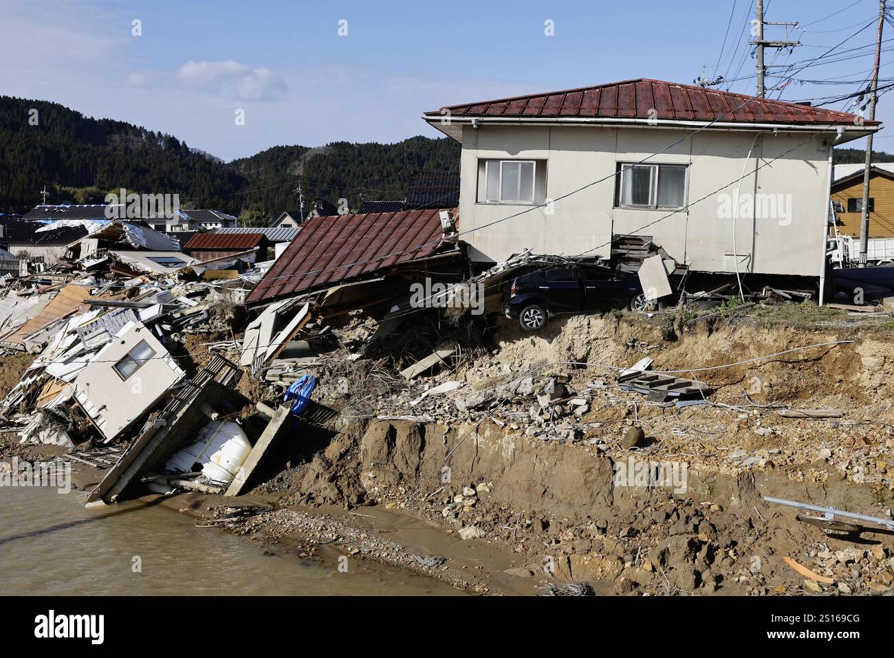 Photo taken on Jan. 1, 2025, shows a collapsed house in Wajima ...