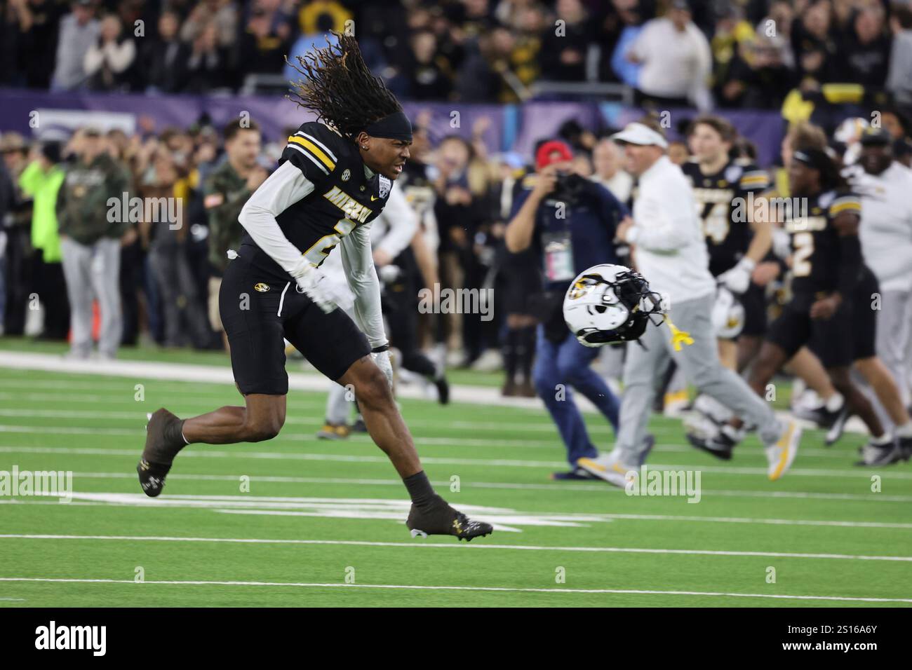 NASHVILLE, TN - DECEMBER 30: Marquis Johnson (2) of Missouri celebrates ...