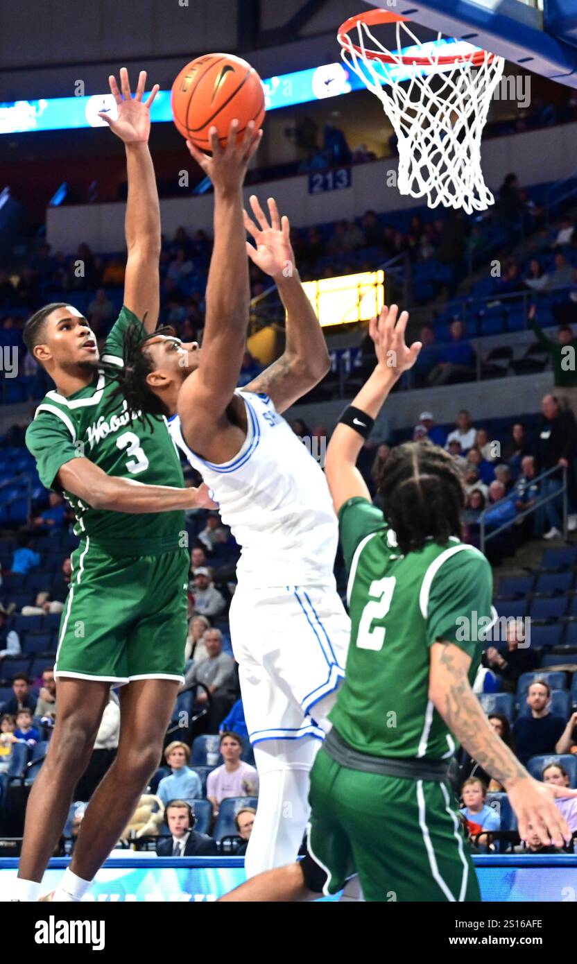 ST. LOUIS, MO - DECEMBER 28: Saint Louis forward Kalu Anya (6) attempts ...