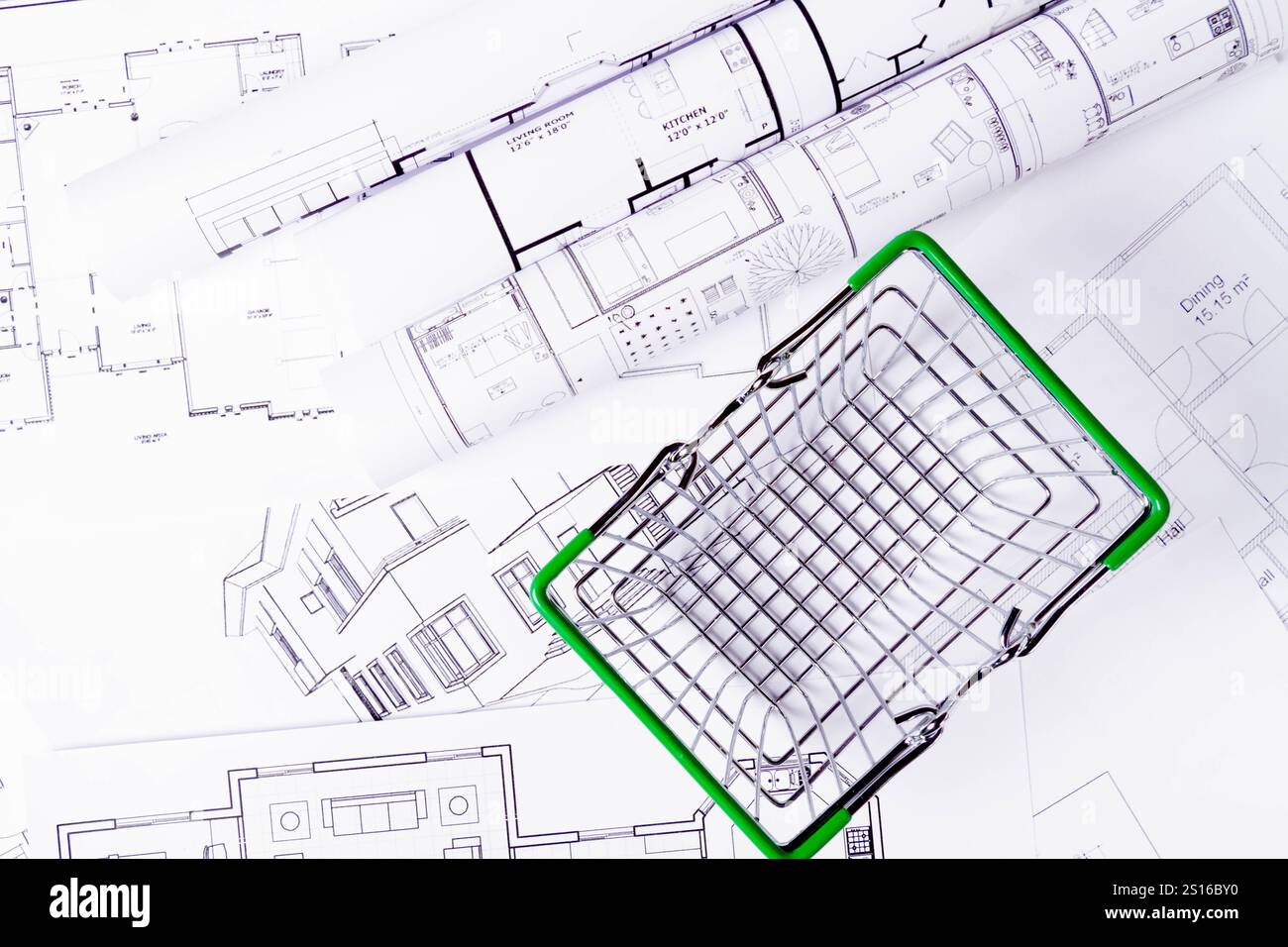 Construction plan in grocery basket. House design project. Miniature ...