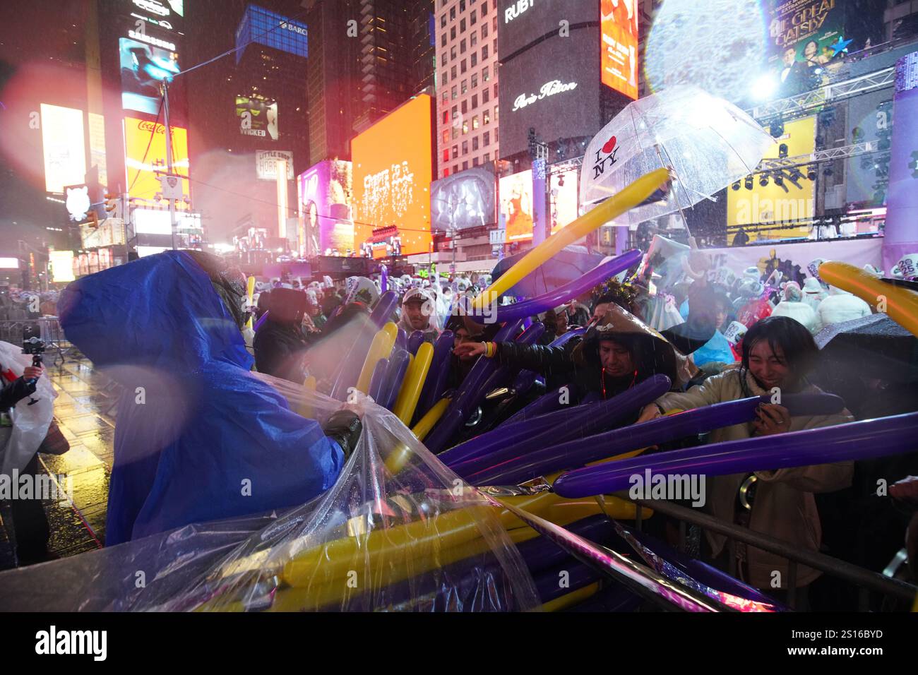 Revelers get their magic balloons during the celebration. The 2025 New ...