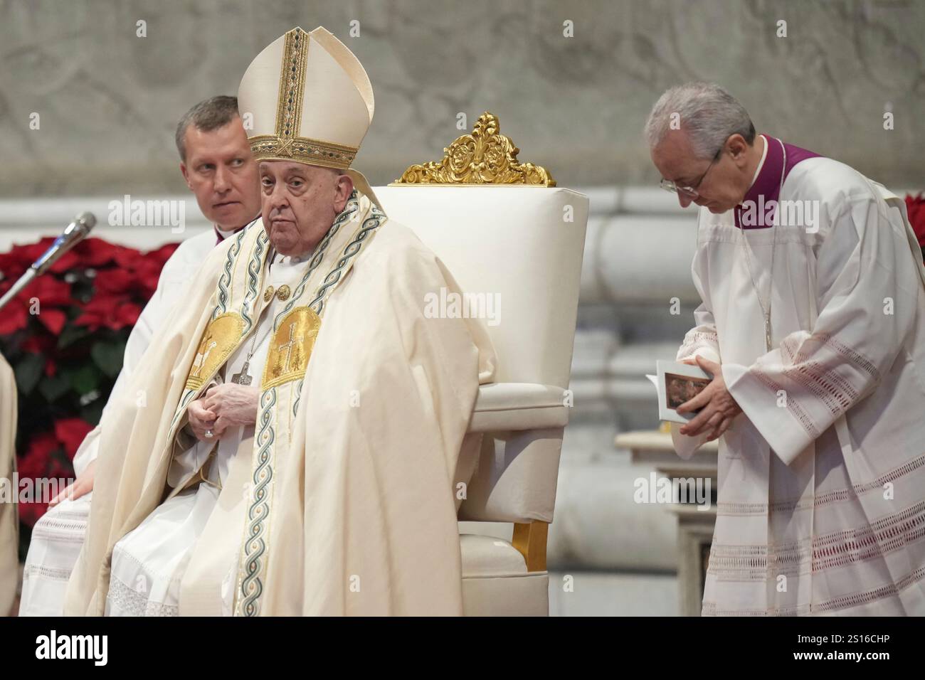 Pope Francis is flanked by Vatican Head Master of Ceremonies, Bishop ...