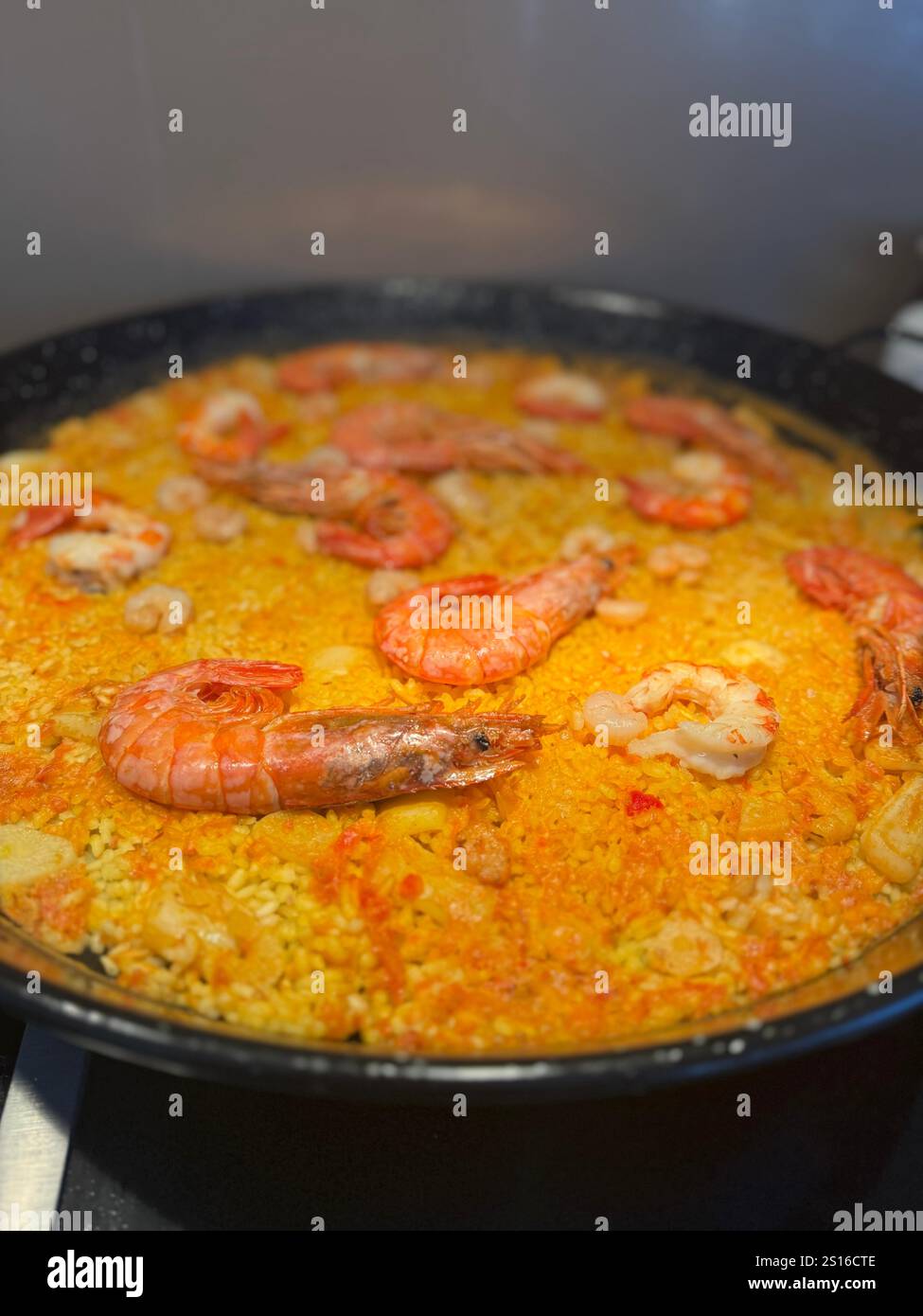 Rice in paella big pan hi-res stock photography and images - Alamy