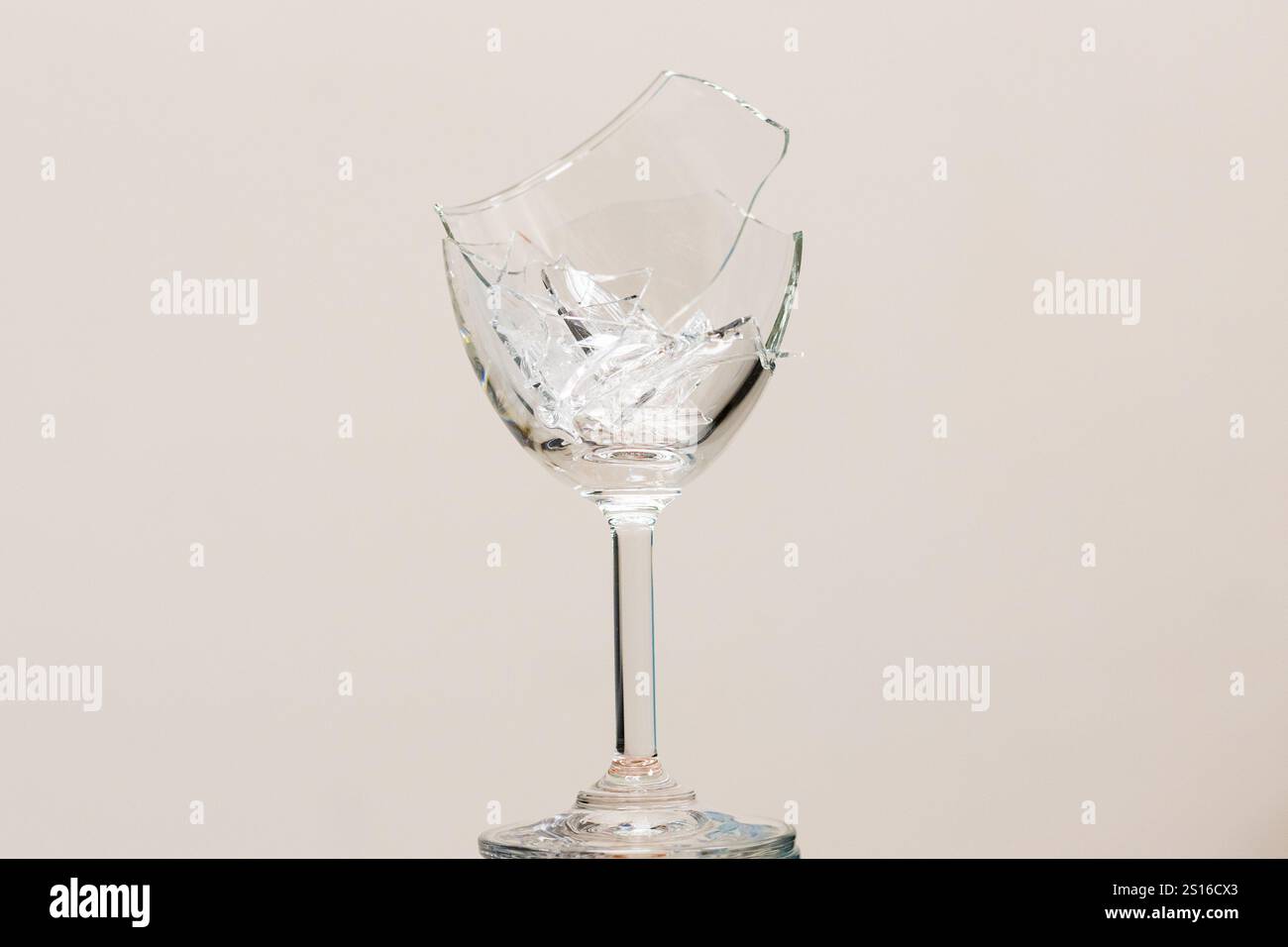 A Broken Empty Wine Glass Stock Photo - Alamy