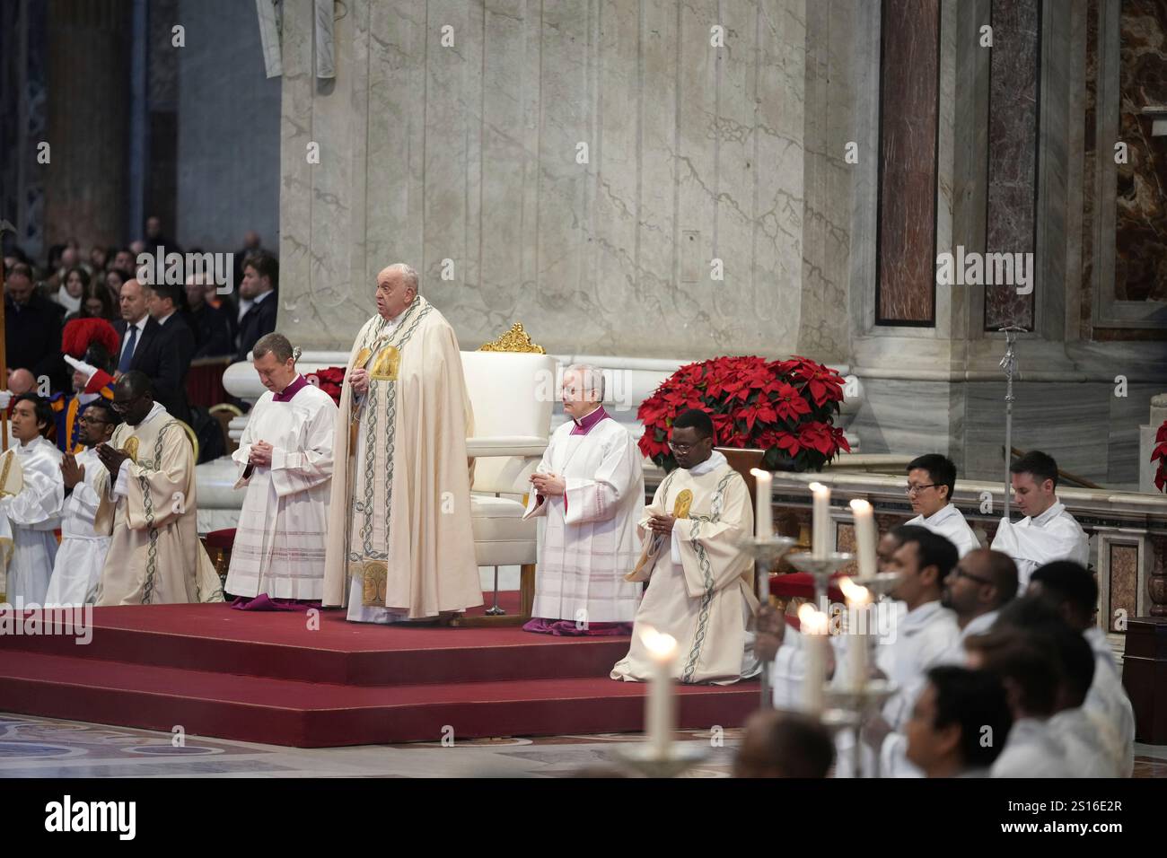 Pope Francis is flanked by Vatican Head Master of Ceremonies, Bishop ...