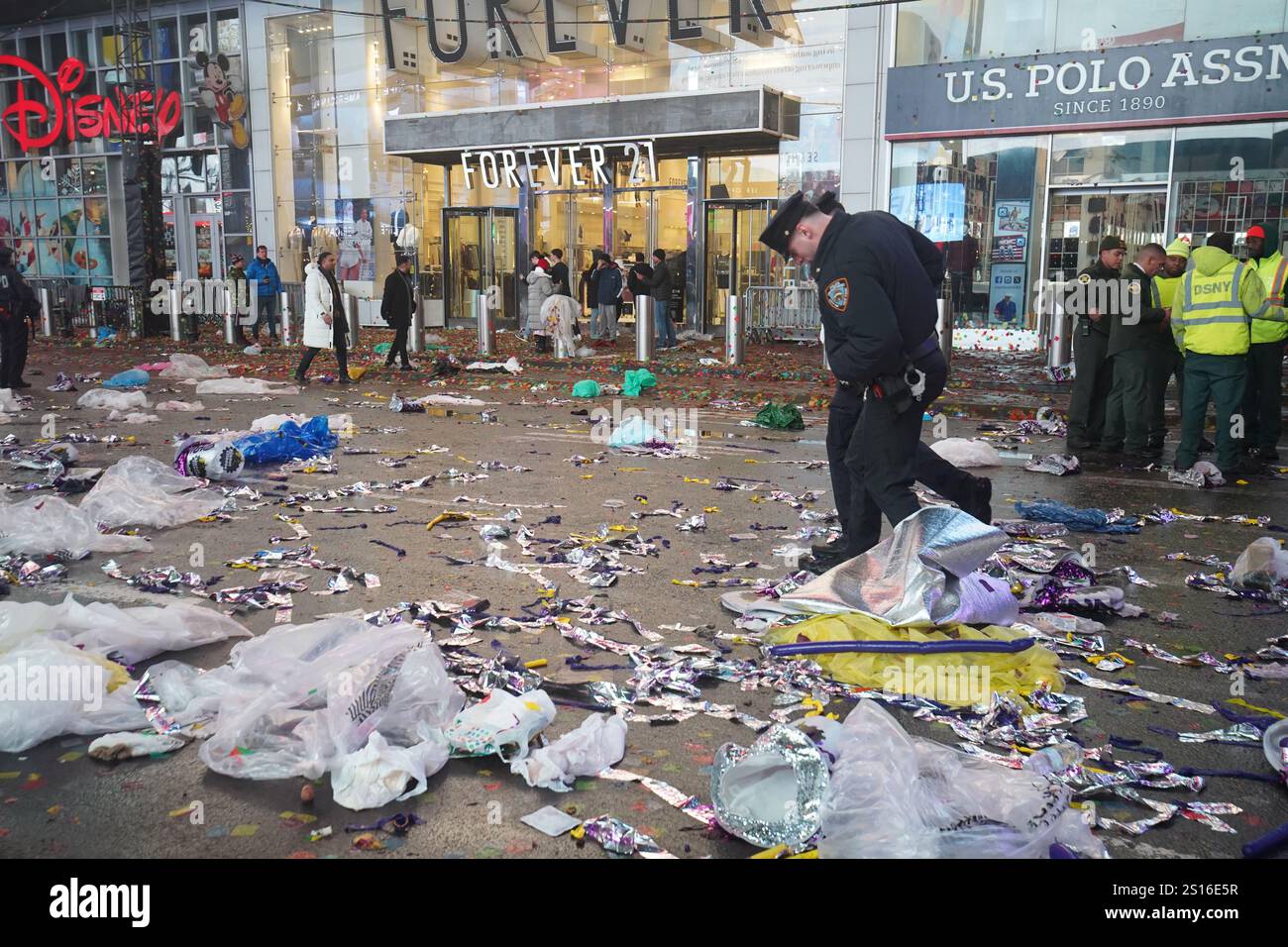 Confetti and discarded debris are seen on the ground at Times Square ...
