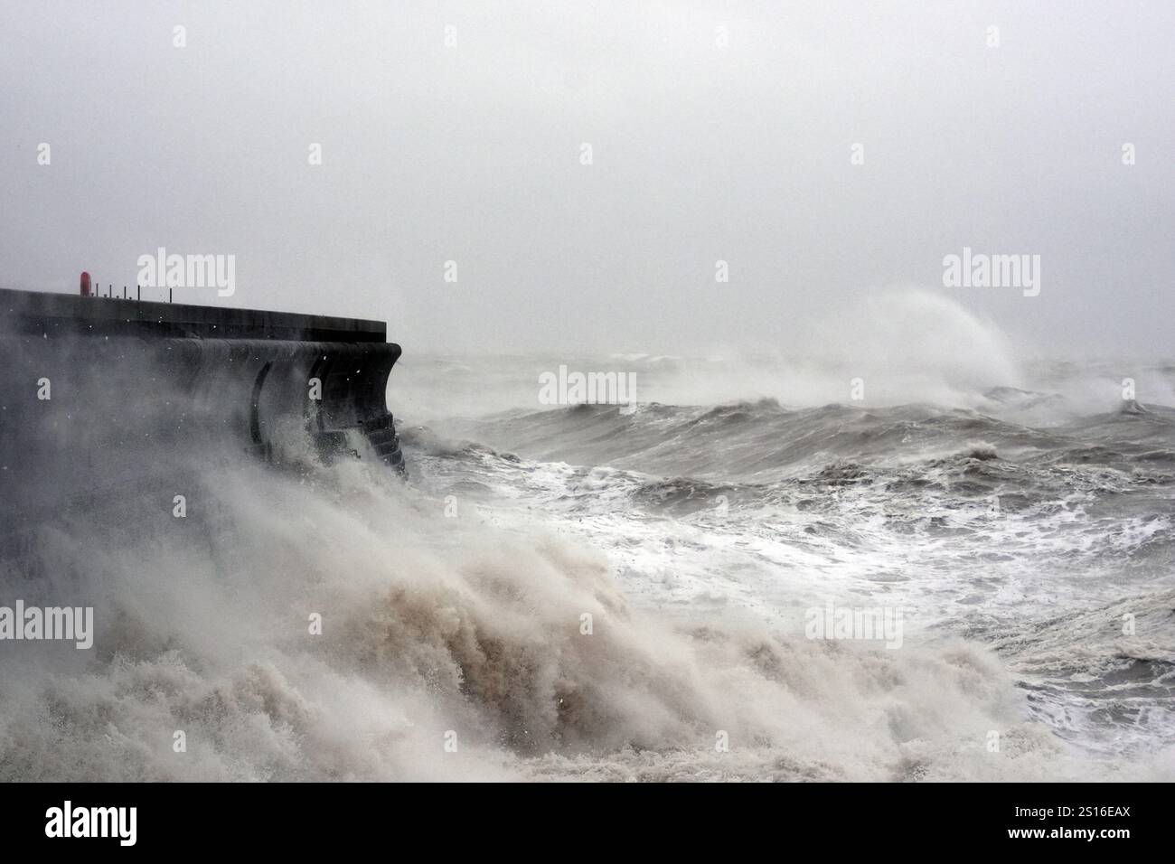 Waves crashing in Dover, Kent, as wind, rain and snow warnings are in ...