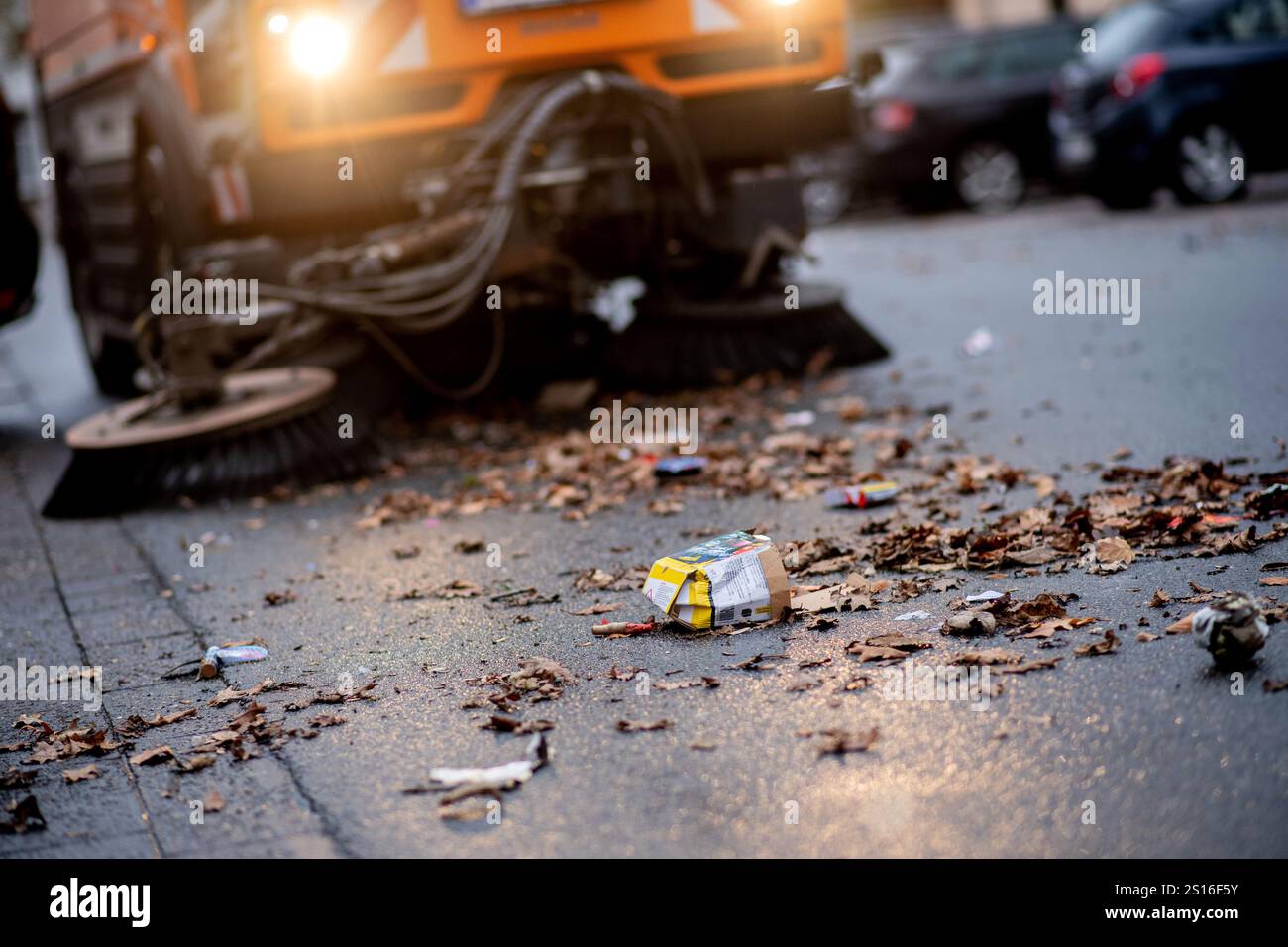 Oldenburg, Germany. 01st Jan, 2025. An employee of the city cleaning ...
