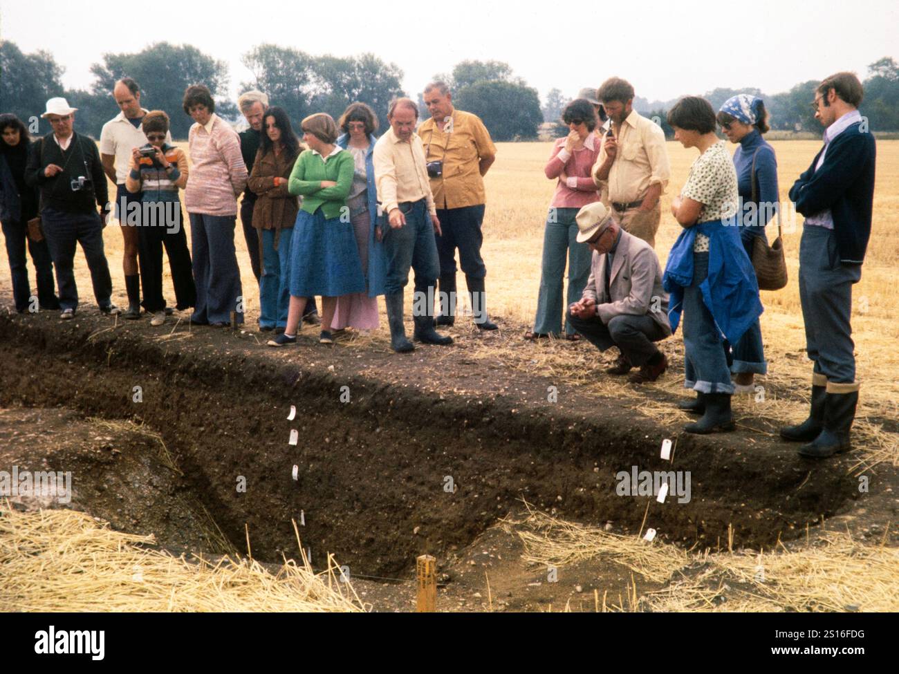 People viewing trench Cambridge University archaeological excavation ...