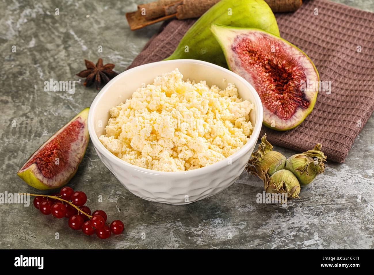 Delicous sheep cottage cheese curd served fig Stock Photo - Alamy