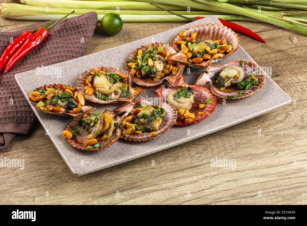 Baked scallops with scalion oil and green onion Stock Photo - Alamy