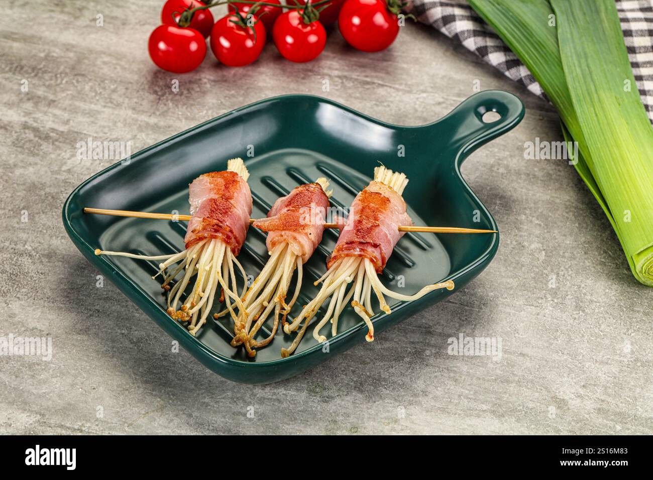 Grilled enoki mushroom with bacon roll wrap Stock Photo - Alamy