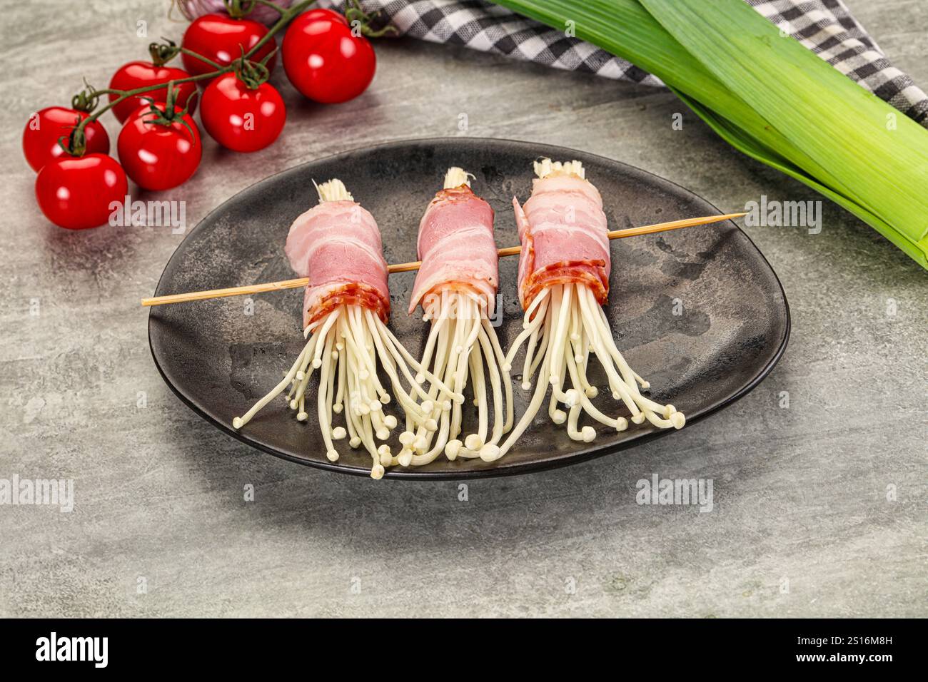 Raw roll with enoki mushroom and bacon Stock Photo - Alamy