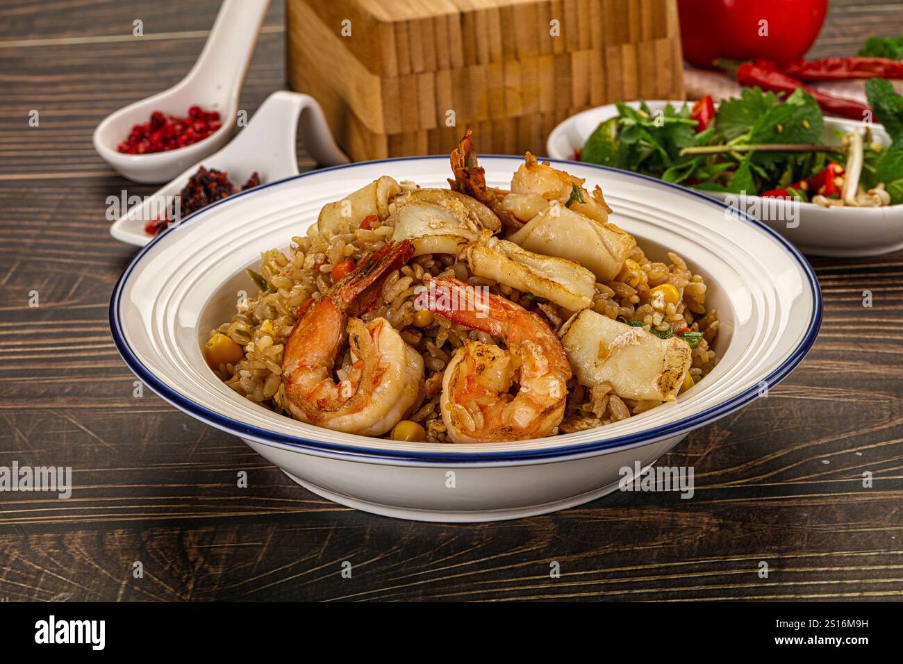 Vietnamese traditional fried rice with prawn and squid - Kom Ran Stock ...