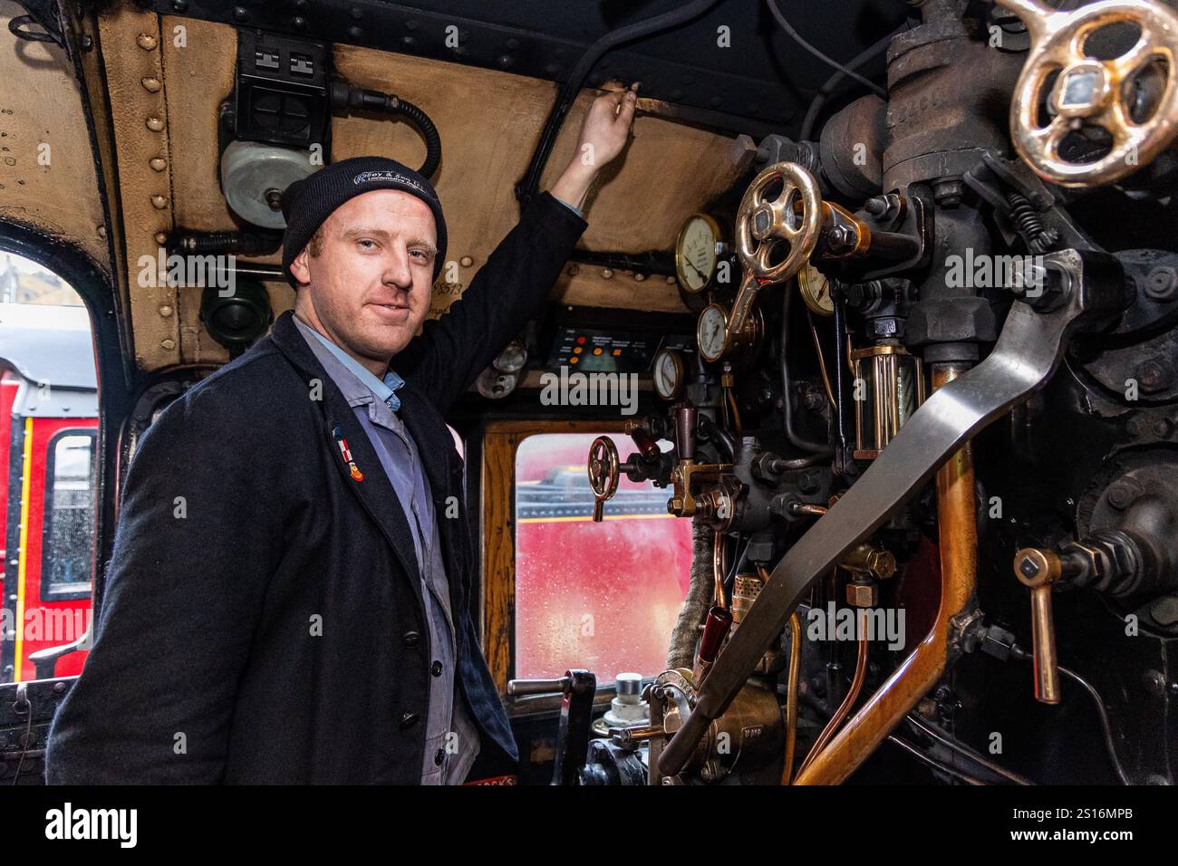 Haworth, UK. 01st Jan, 2025. driver Alex Simkins gets ready to blow the ...
