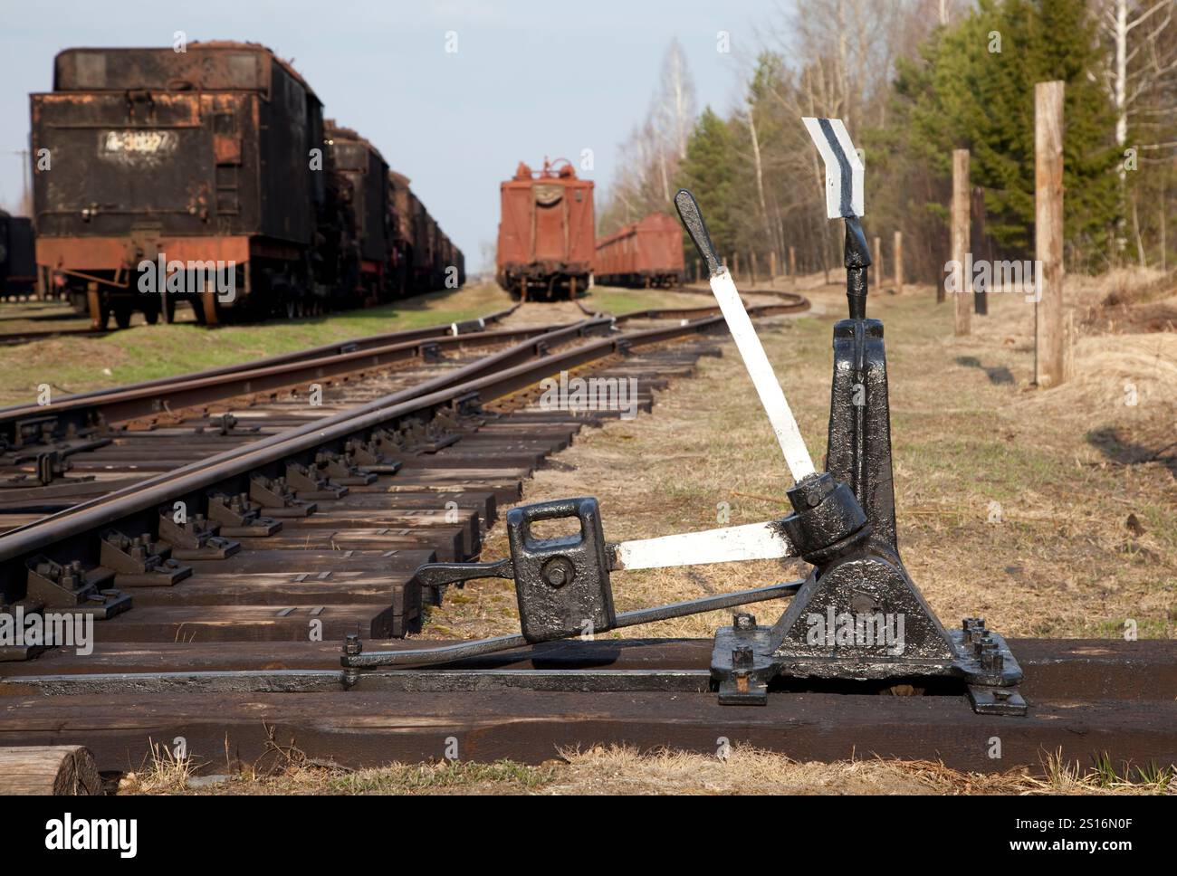 Manual railroad switch by the rail with point indicator Stock Photo - Alamy
