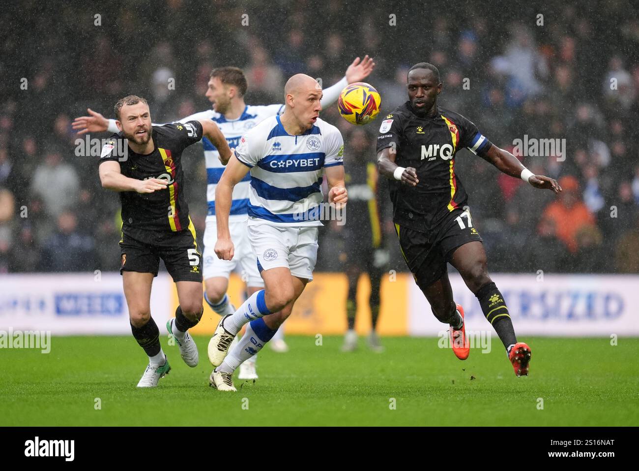 Queens Park Rangers' Michael Frey (centre) and Watford's Moussa Sissoko ...