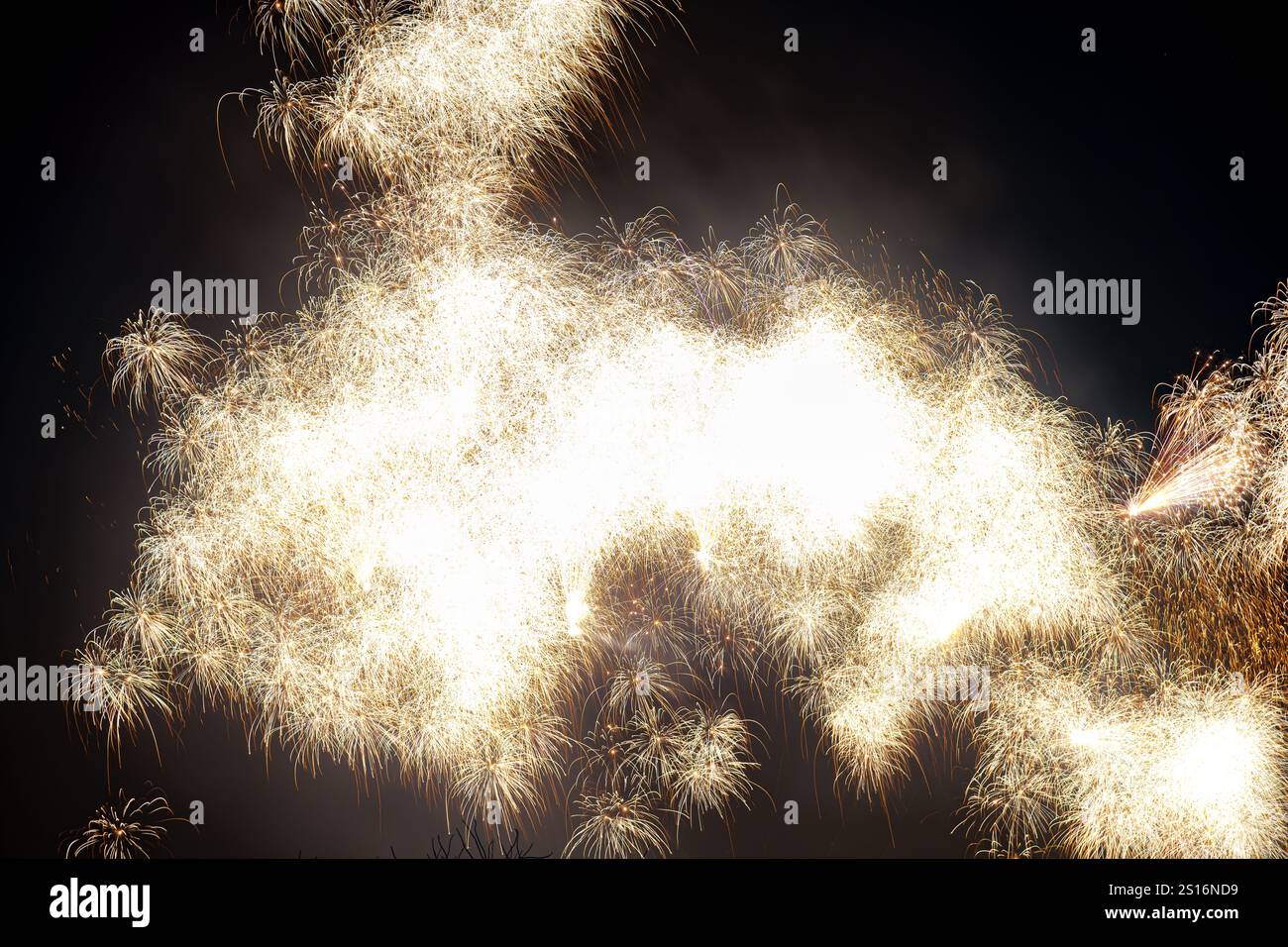 A captivating and vibrant display of bright and colorful sparks from ...