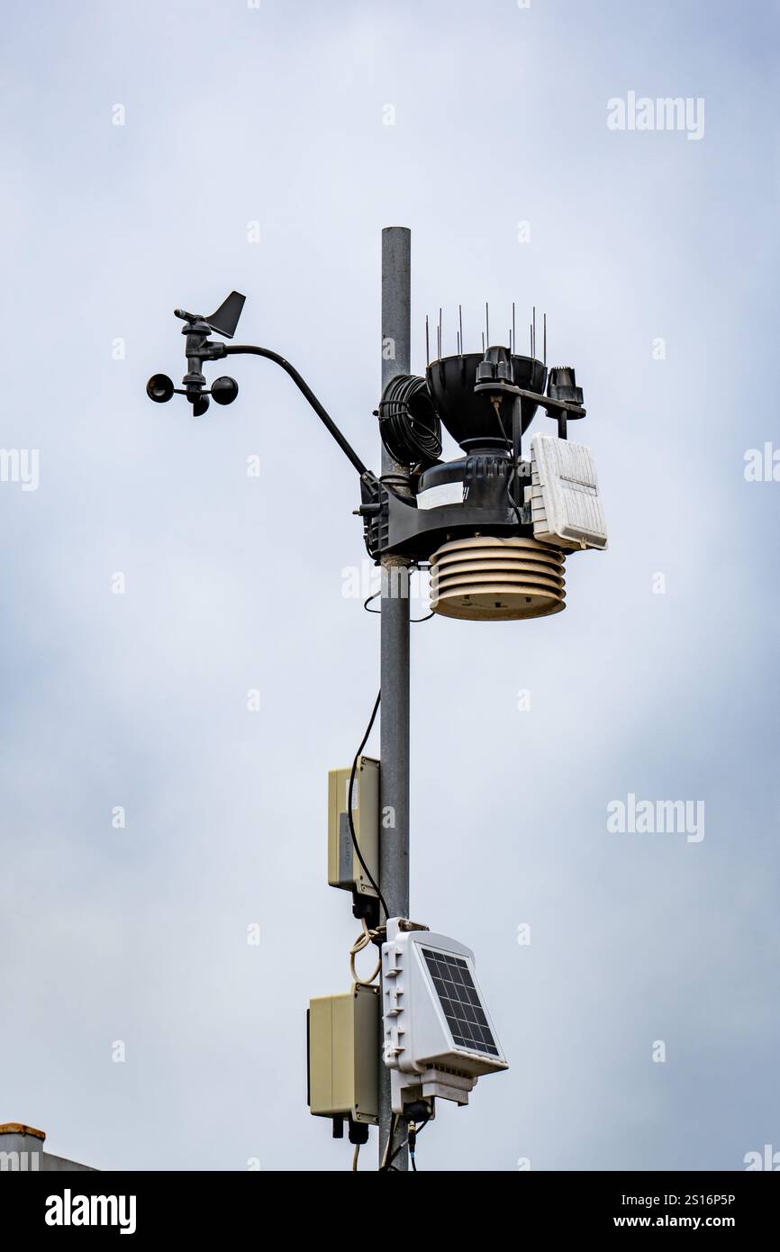 Weather station instruments against blue sky background Stock Photo - Alamy