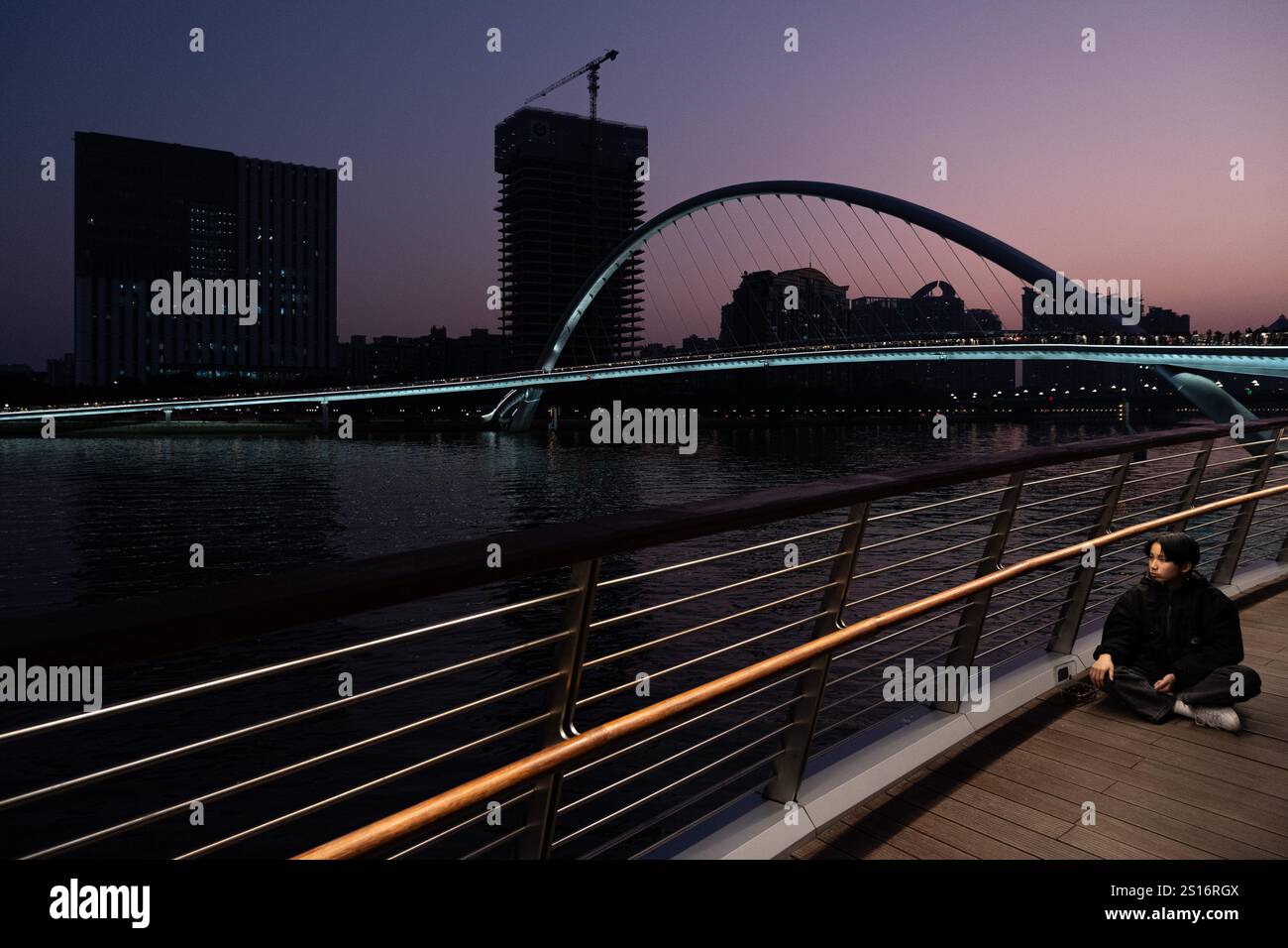 Guangzhou, China. 01st Jan, 2025. A tourist seen pose for a photo at ...