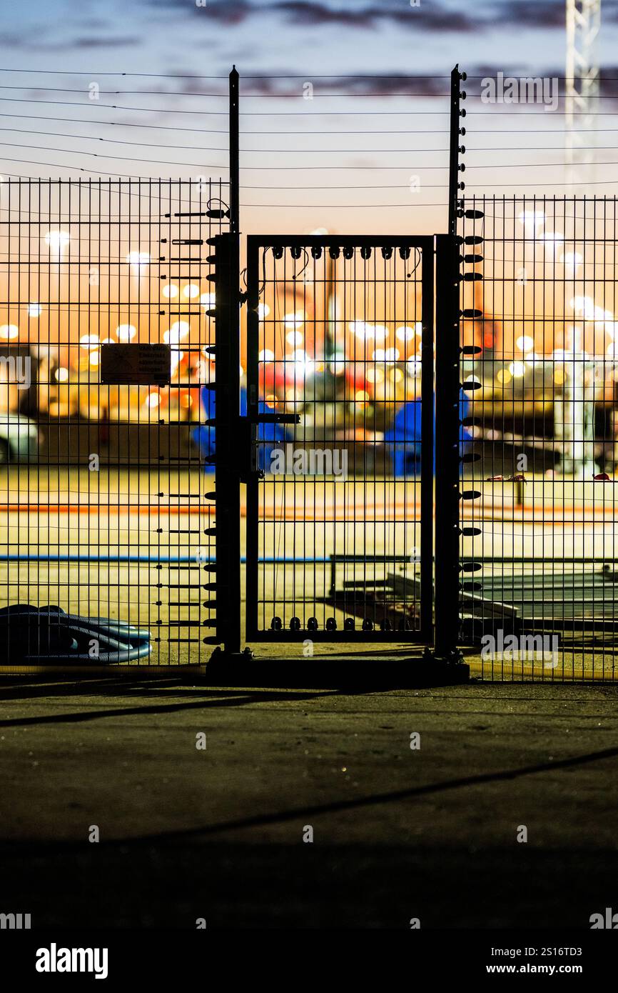Fence and gate of a high security port Stock Photo - Alamy