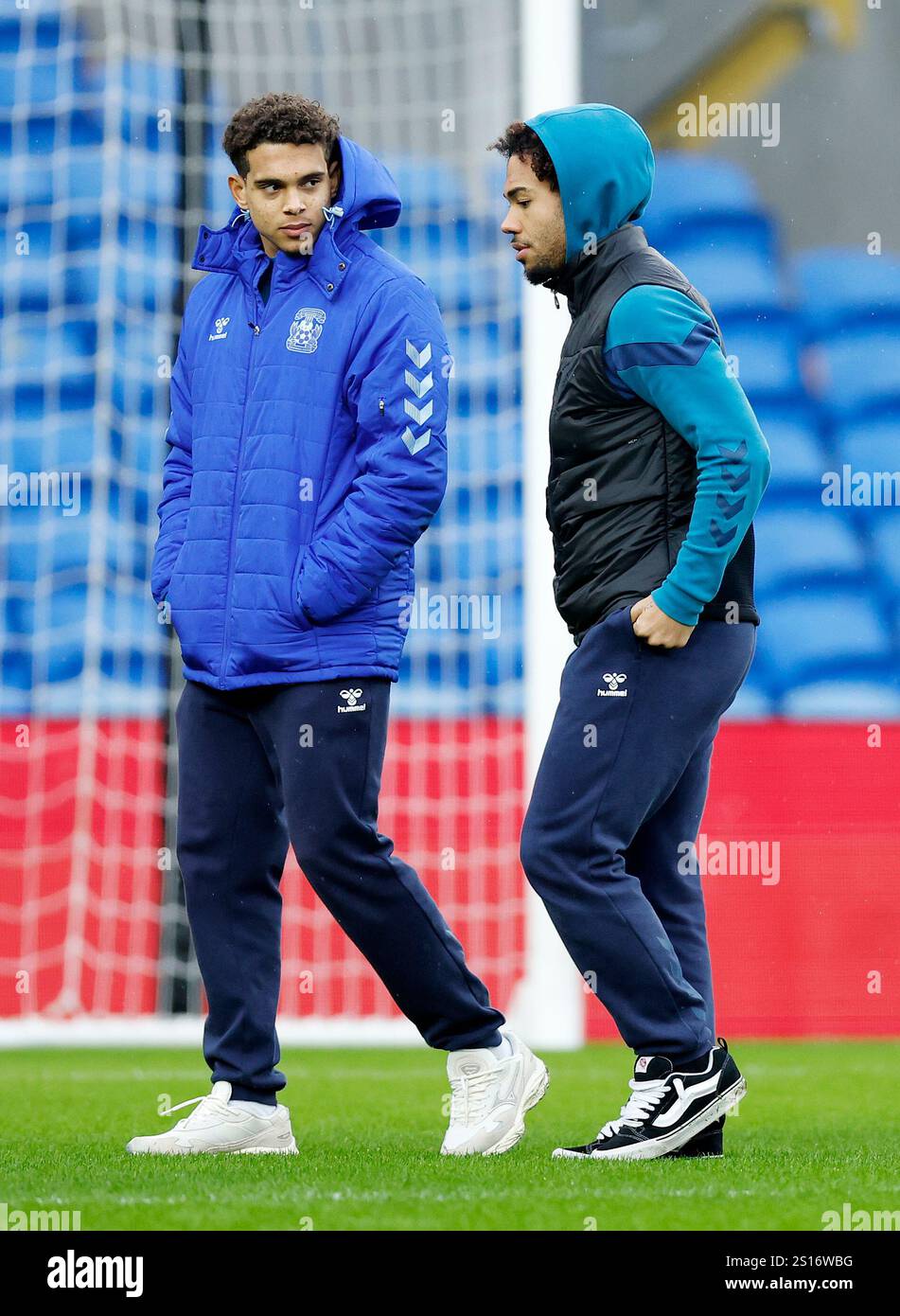 Coventry City's Raphael Borges Rodrigues (left) and Milan van Ewijk ...