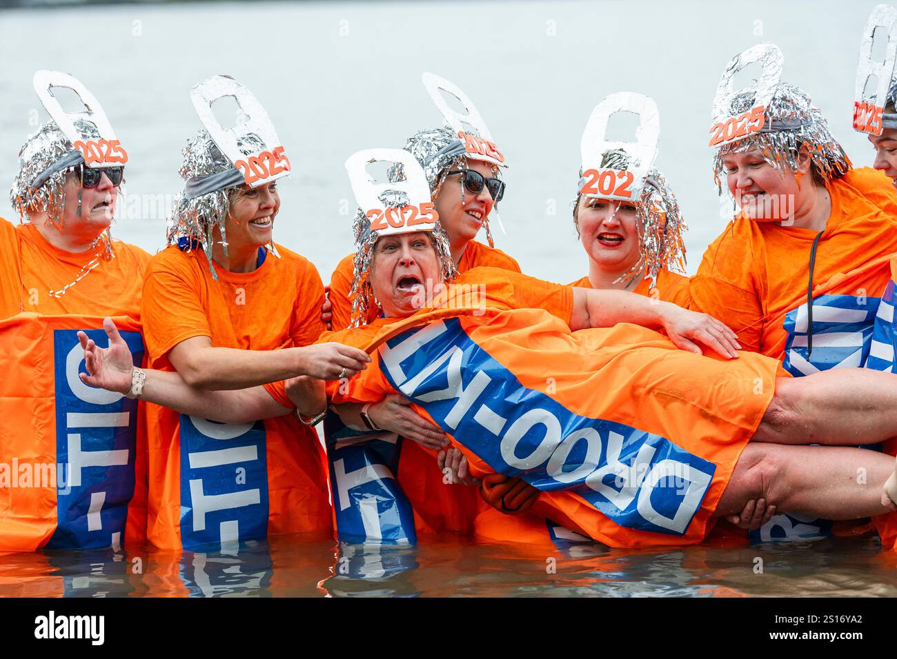 South Queensferry, UK. 01st Jan, 2025. People take part in the annual ...