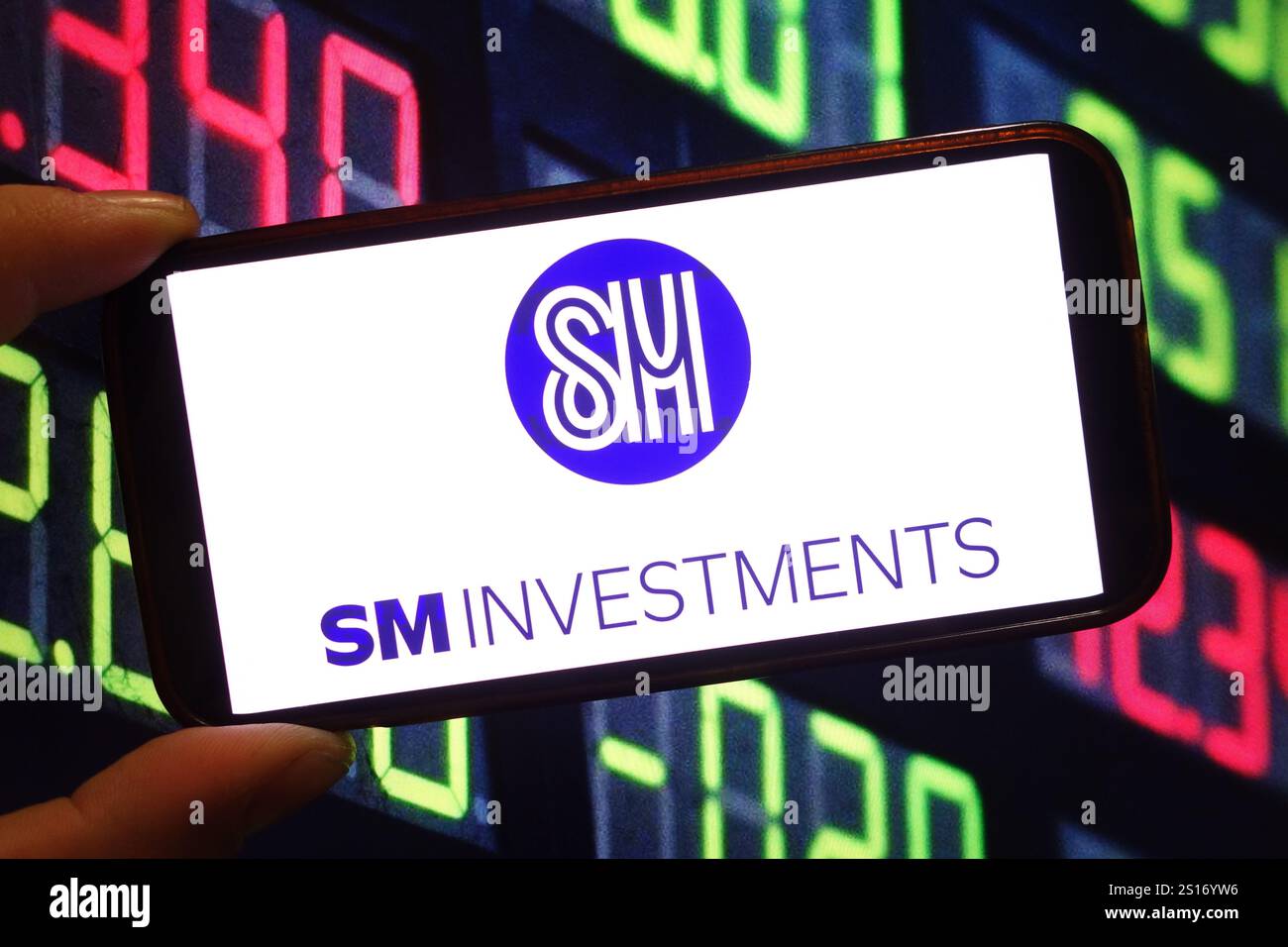 In this photo illustration, the SM Investments Corporation company logo ...