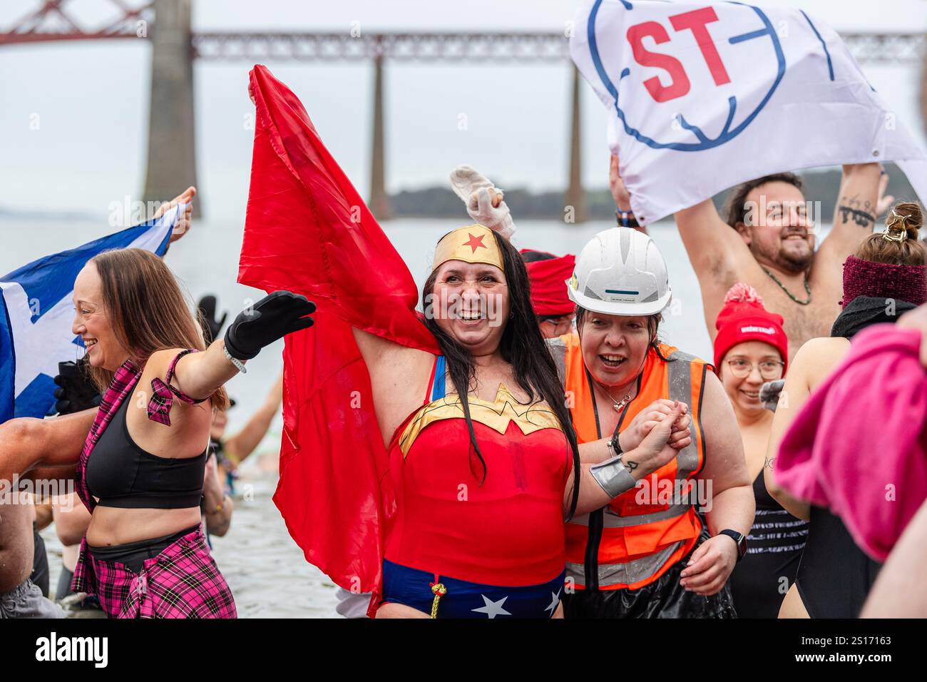South Queensferry, UK. 01st Jan, 2025. People take part in the annual ...