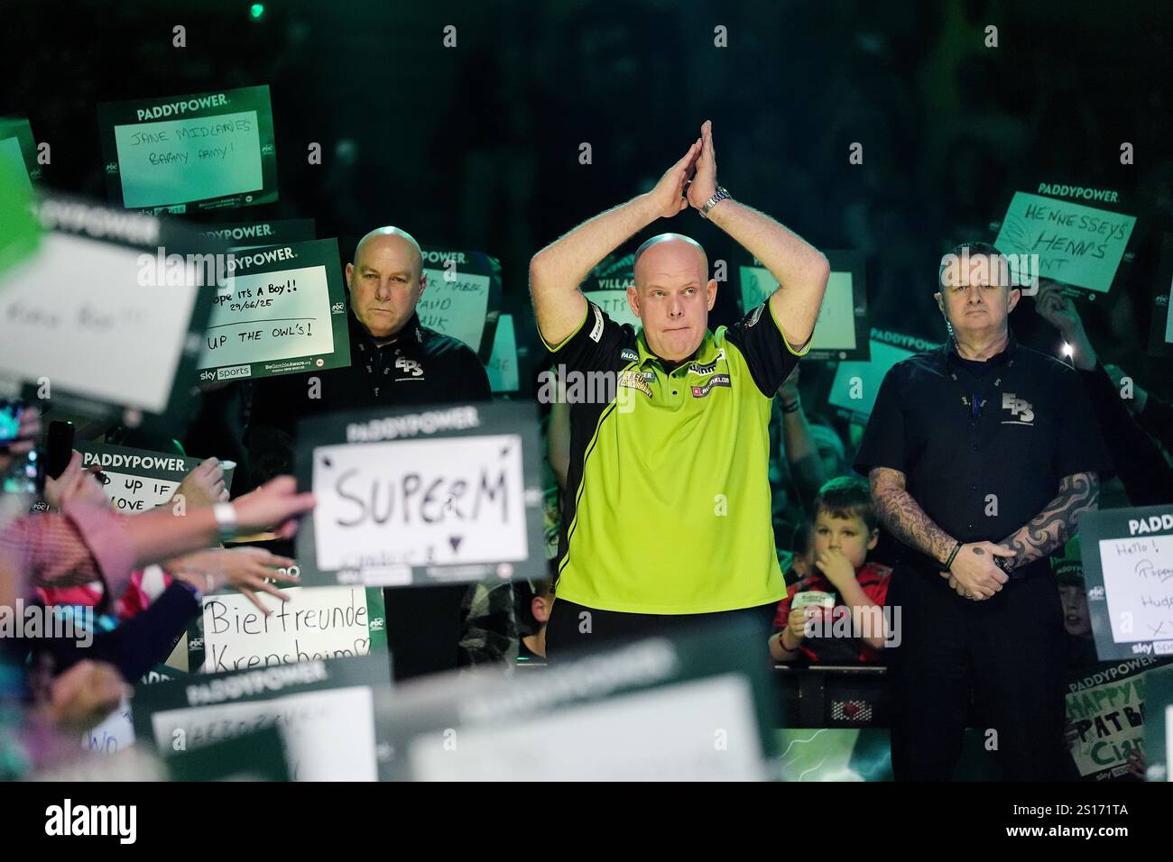 Michael van Gerwen walks out for their quarter final match against ...