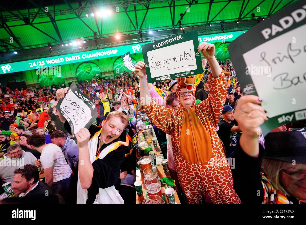 Darts fans in fancy dress on day fourteen of the Paddy Power World ...