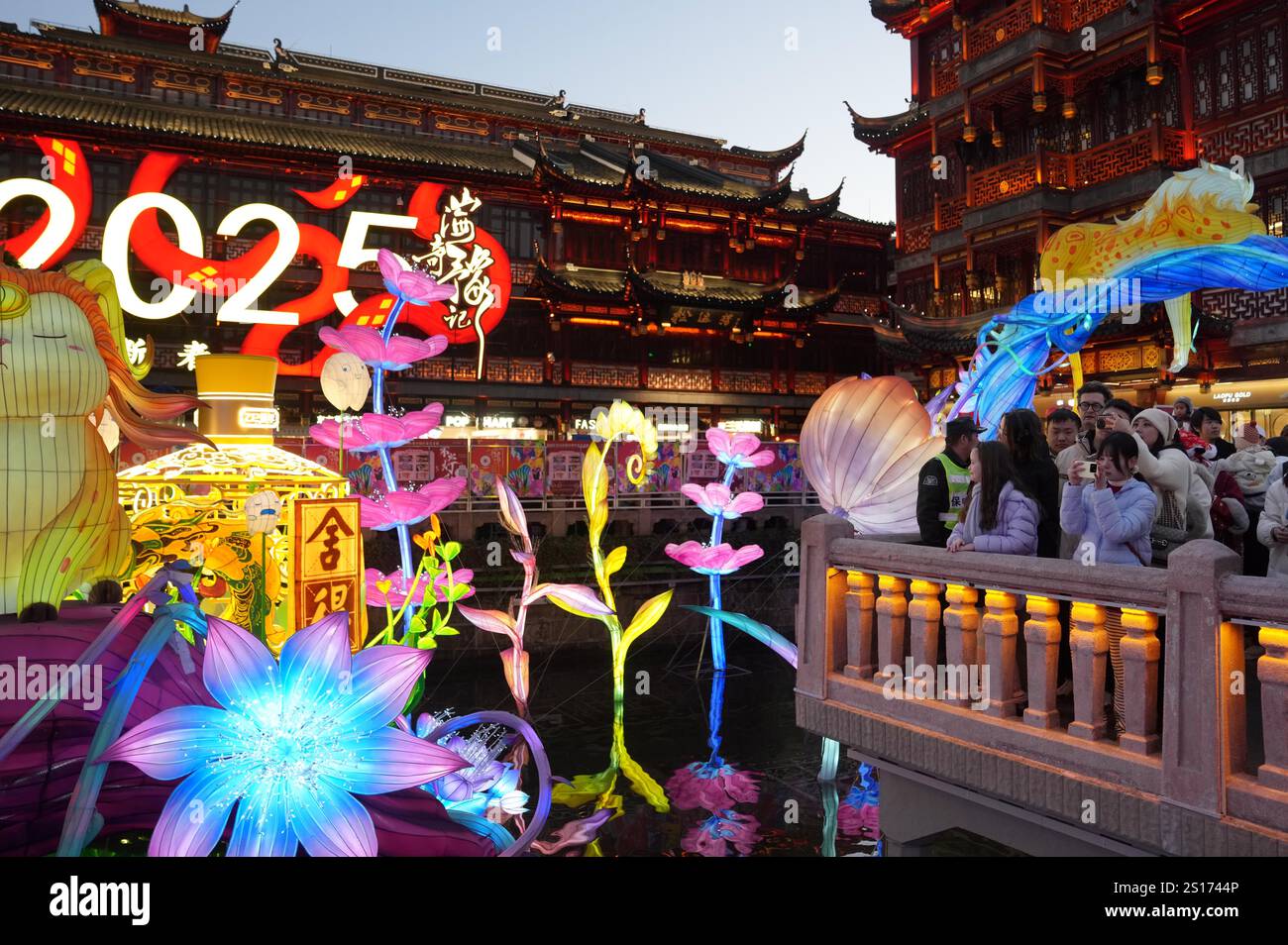 Shanghai. 1st Jan, 2025. People visit the Yuyuan Garden Lantern ...
