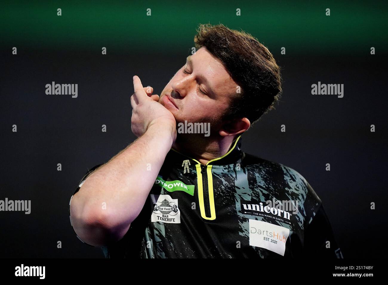Callan Rydz during their quarter final match against Michael van Gerwen ...