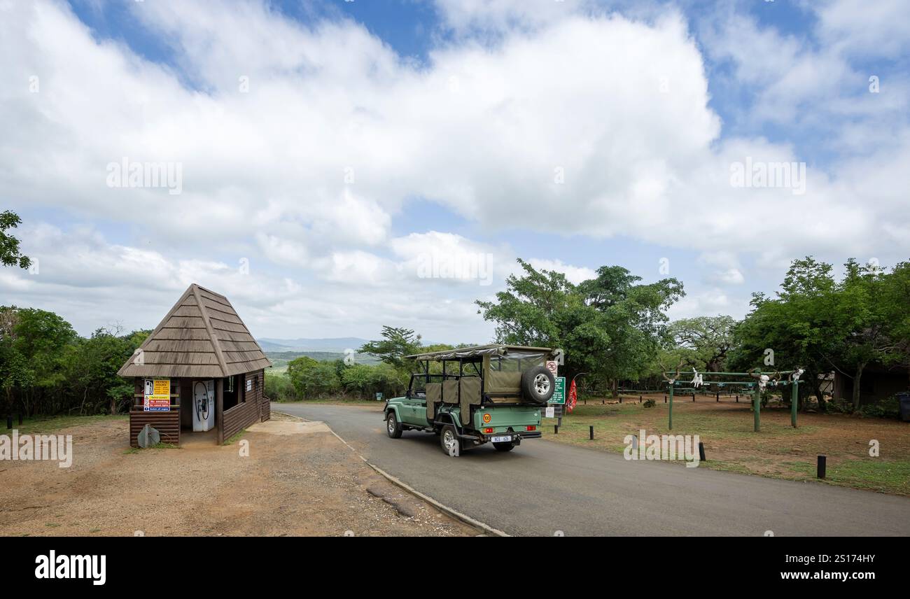 Safari vehicle heading out on game drive from Mpila Camp in Hluhluwe ...