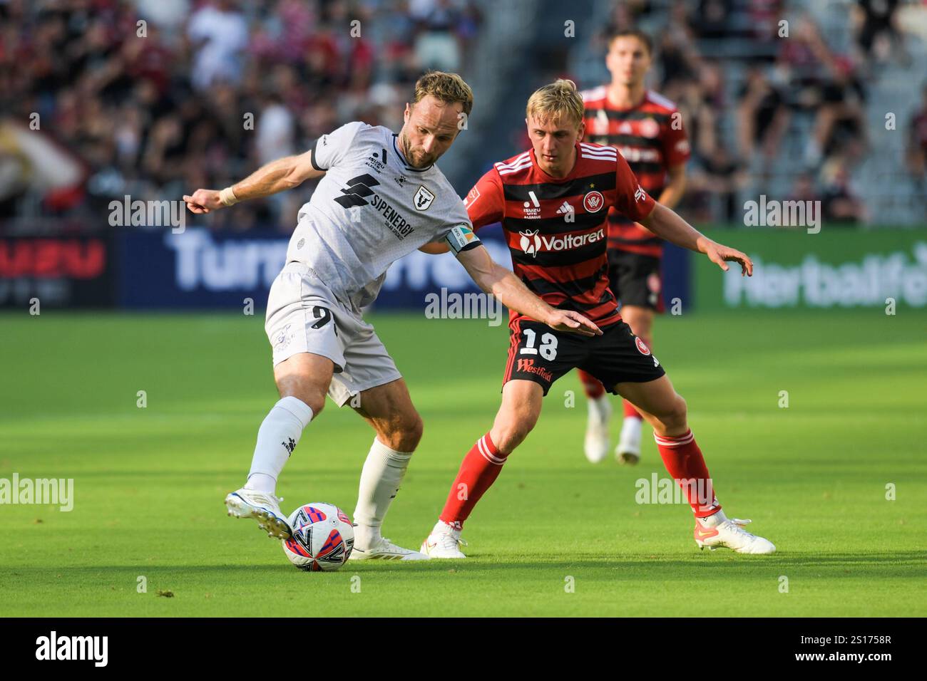 Parramatta, Australia. 01st Jan, 2025. Valere Bruno Rene Germain (L) of ...