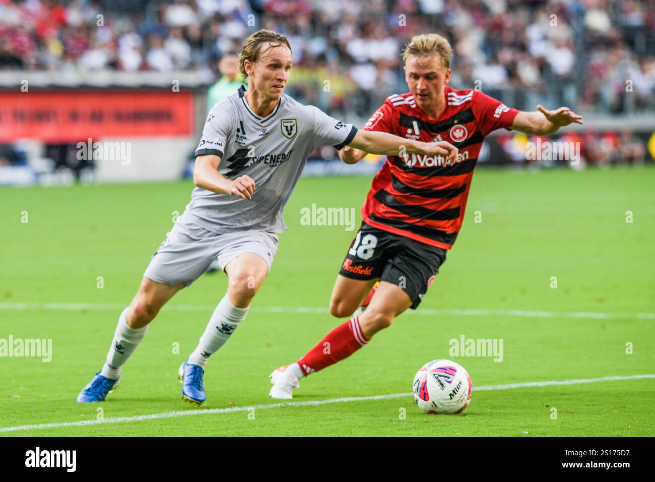 Parramatta, Australia. 01st Jan, 2025. Jake John Hollman (L) of ...