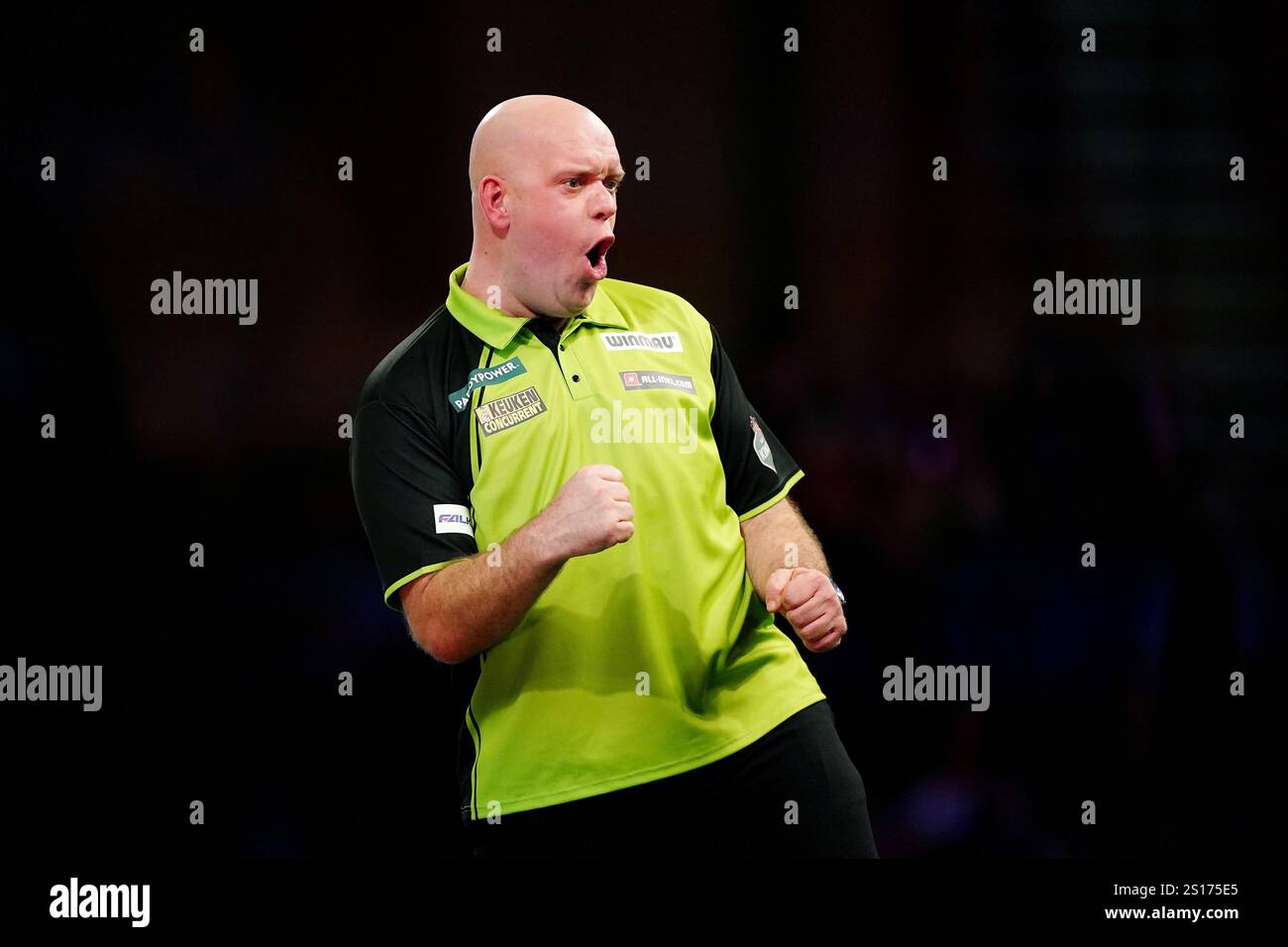 Michael van Gerwen celebrates during their quarter final match against ...