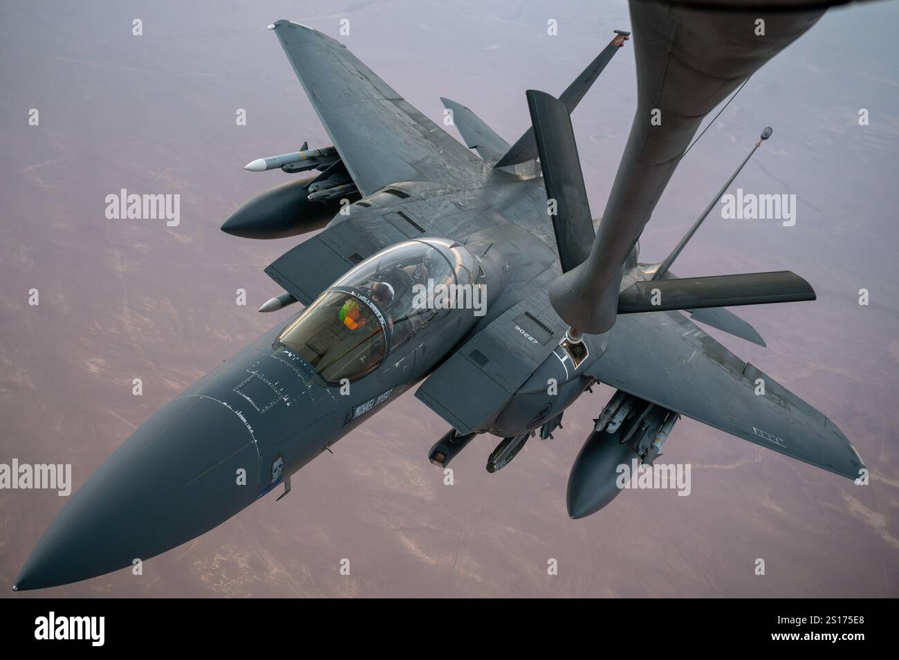 A U.S. Air Force F-15E Strike Eagle is prepares to be refueled over U.S ...
