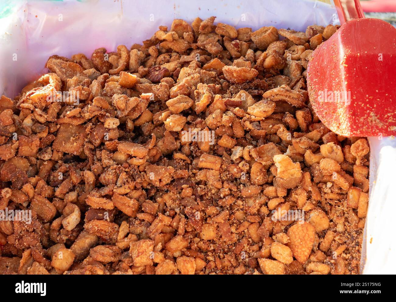 Large pile of pork skin rinds snack sold on a market stall Stock Photo ...