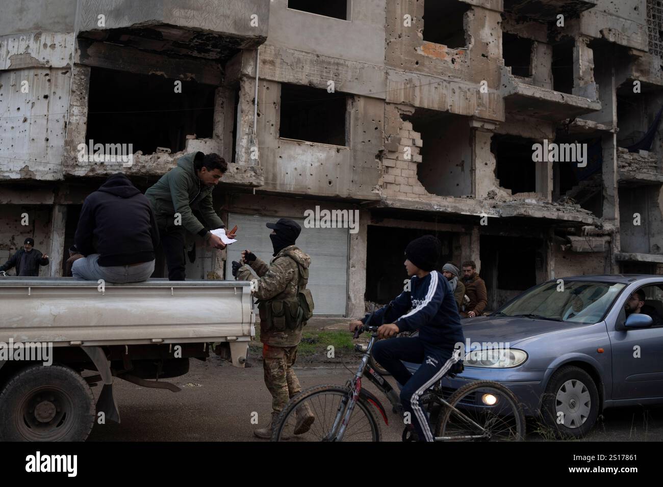 A member of the new armed forces, a former rebel who took part in the ...