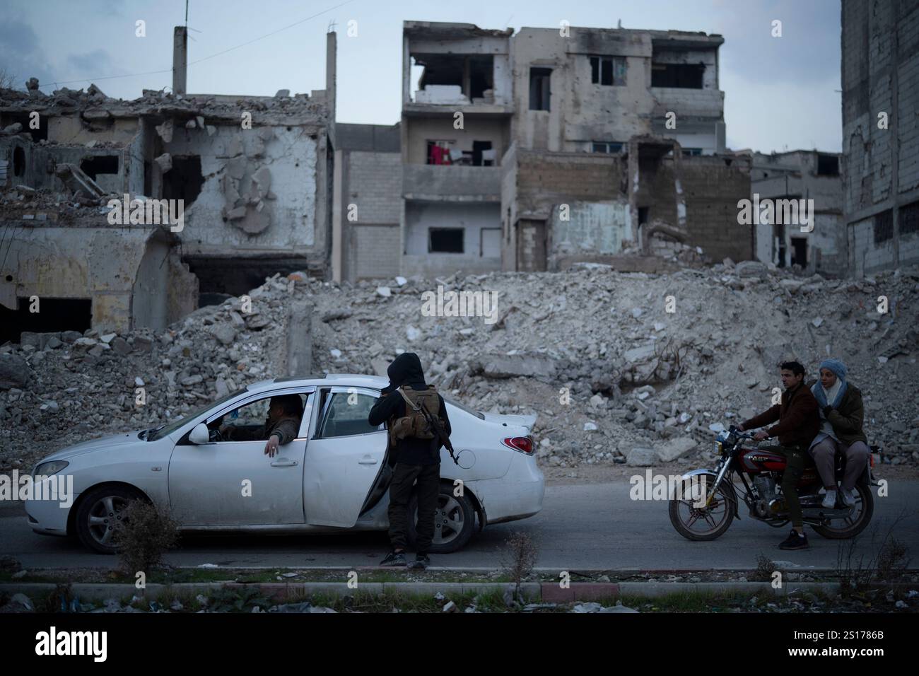 A member of the new armed forces, a former rebel who took part in the ...