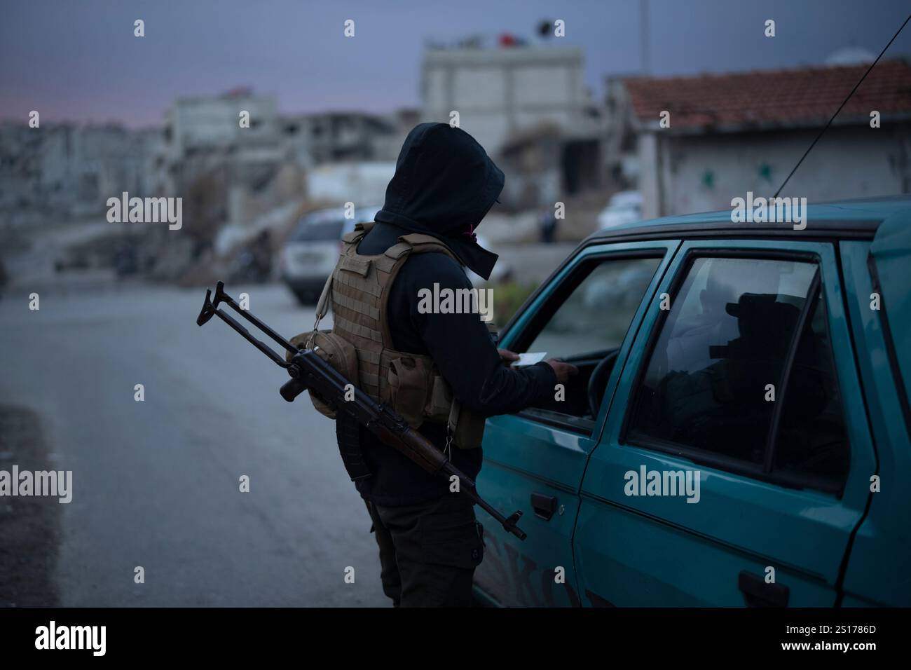 A member of the new armed forces, a former rebel who took part in the ...