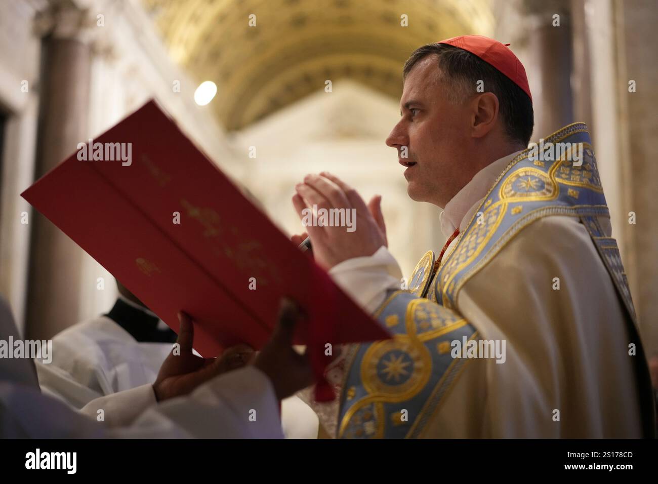 Cardinal Rolandas Makrickas opens the holy door of the Santa Maria ...