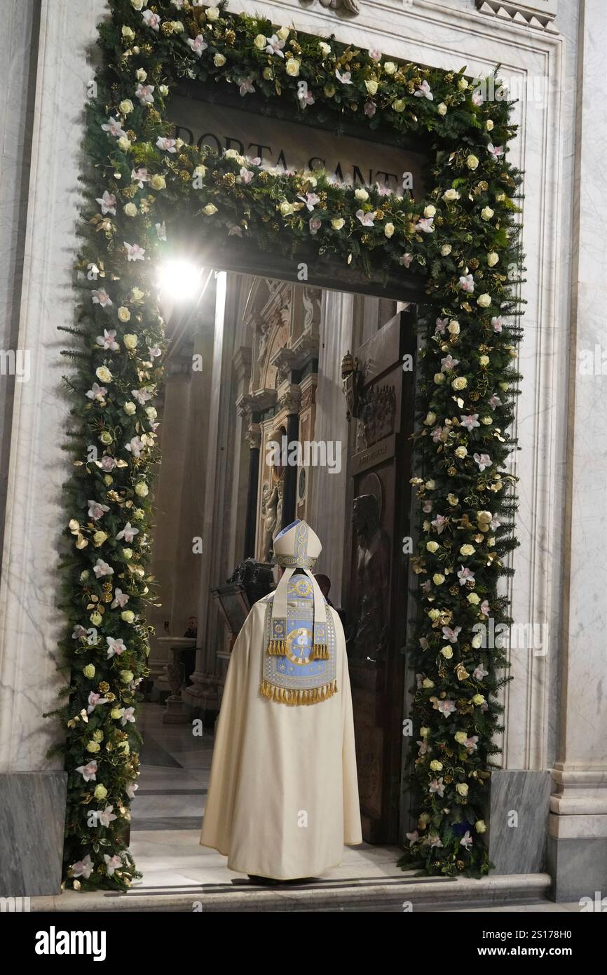Cardinal Rolandas Makrickas opens the holy door of the Santa Maria ...