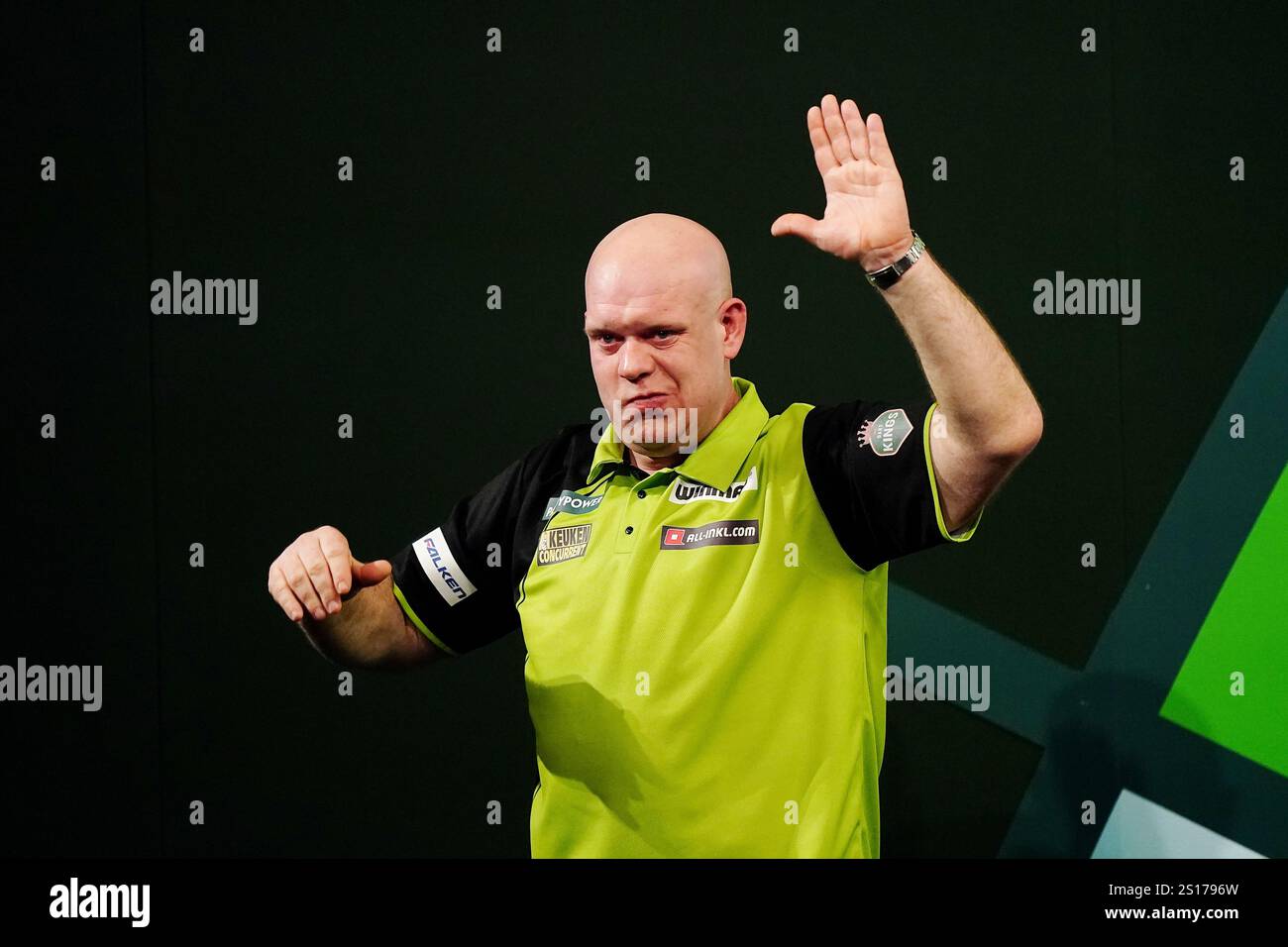 Michael van Gerwen celebrates after winning their quarter final match ...