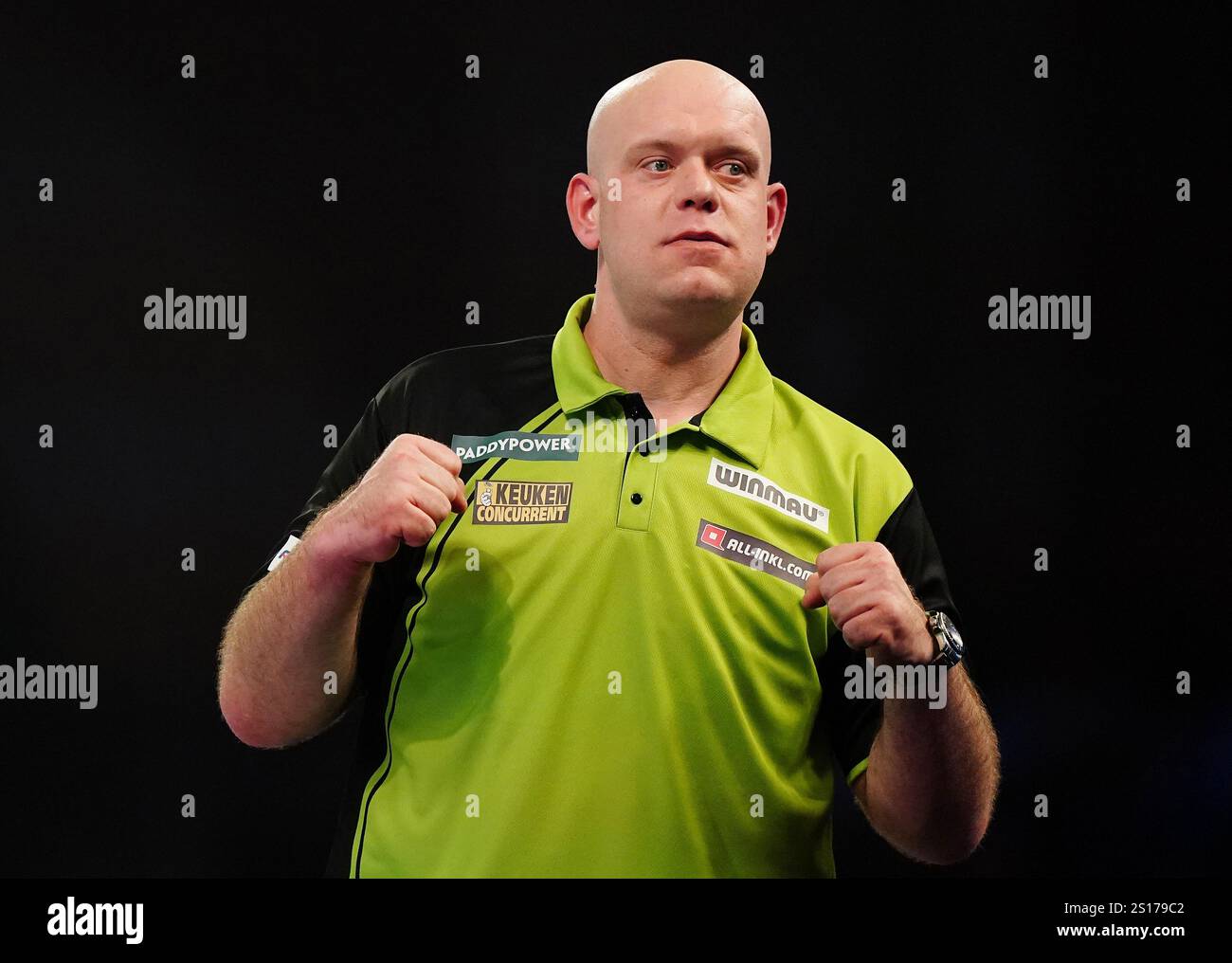 Michael van Gerwen celebrates after winning their quarter final match ...
