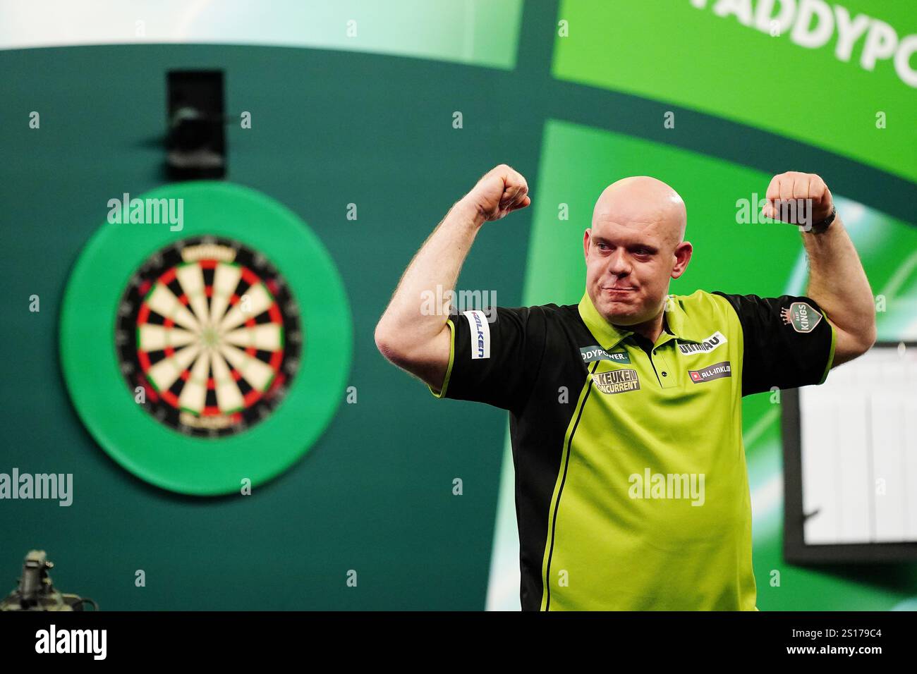 Michael van Gerwen celebrates after winning their quarter final match ...