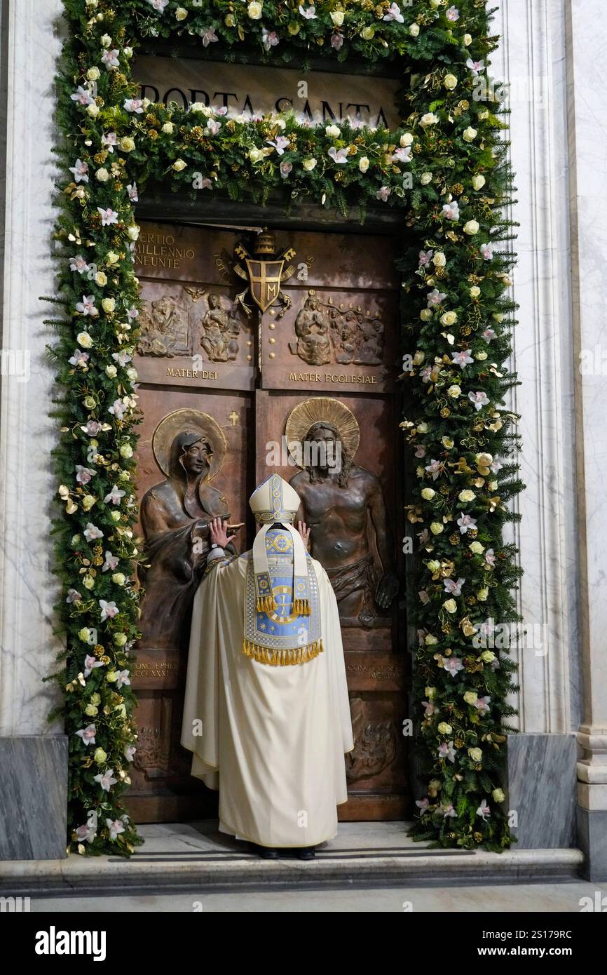 Cardinal Rolandas Makrickas opens the holy door of the Santa Maria ...